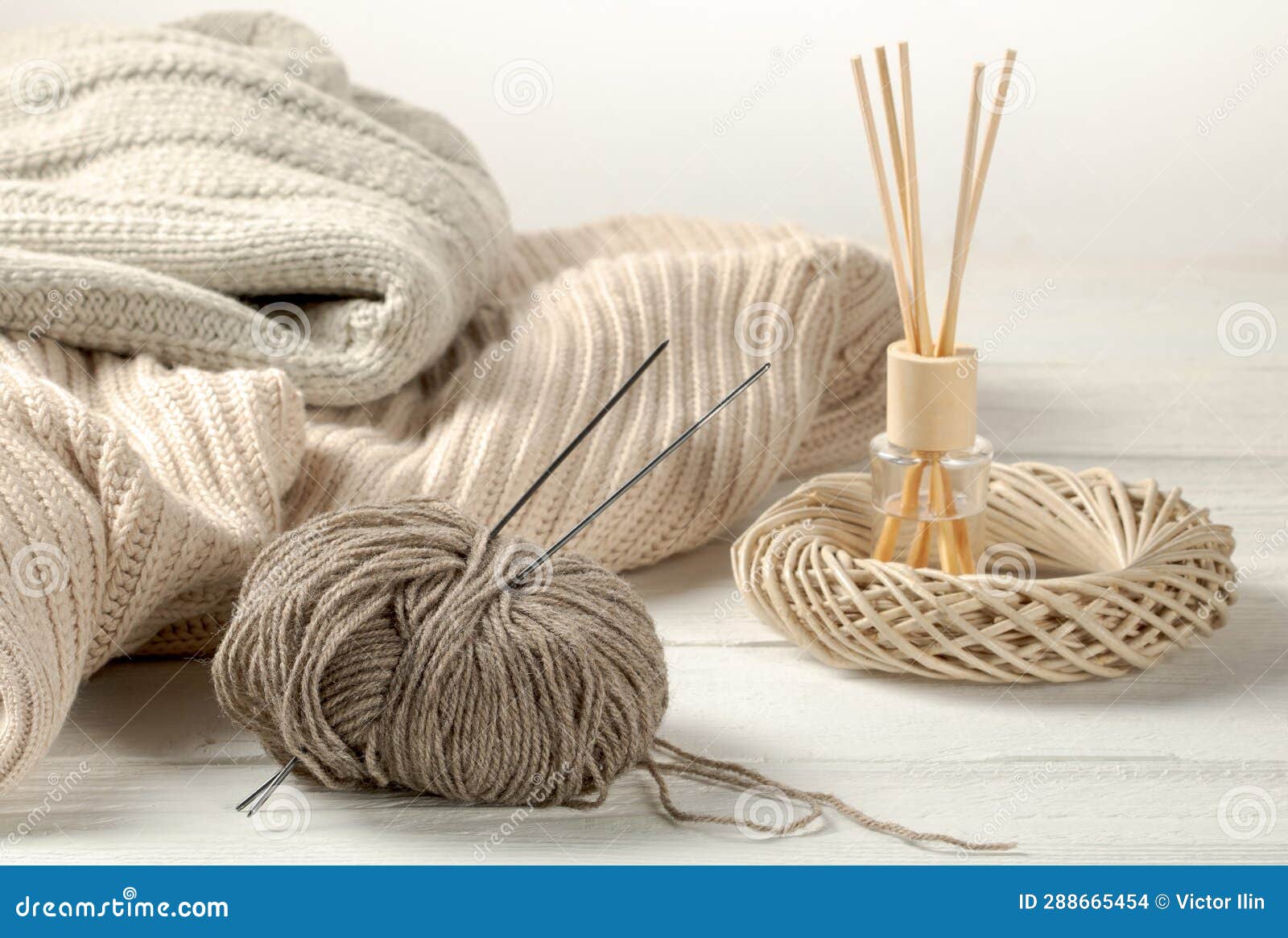Cozy Home Interior - Knitted Things and Balls of Woolen Threads on a ...