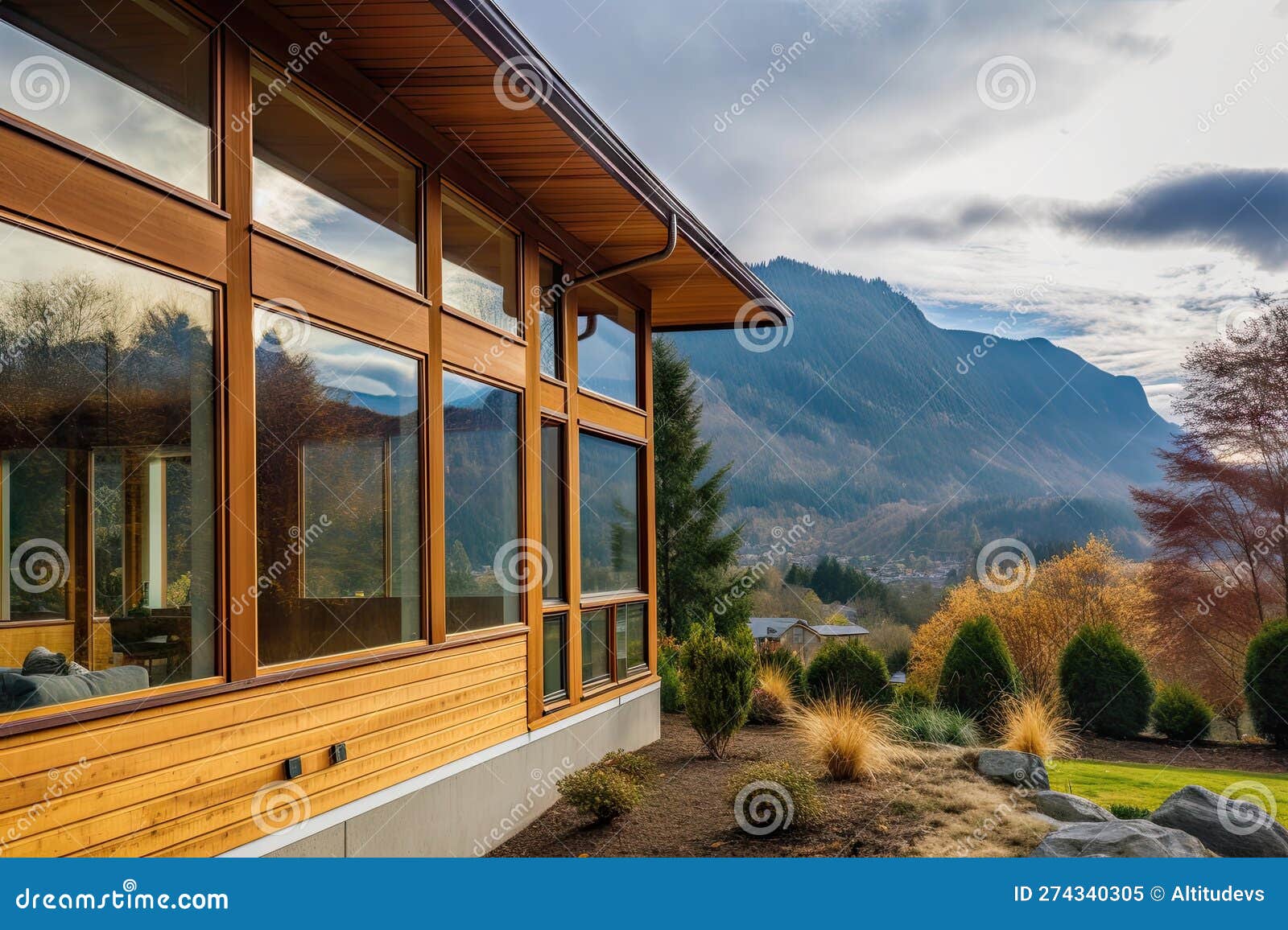 Cozy House Exterior with Window View of Scenic Mountain Range Stock ...