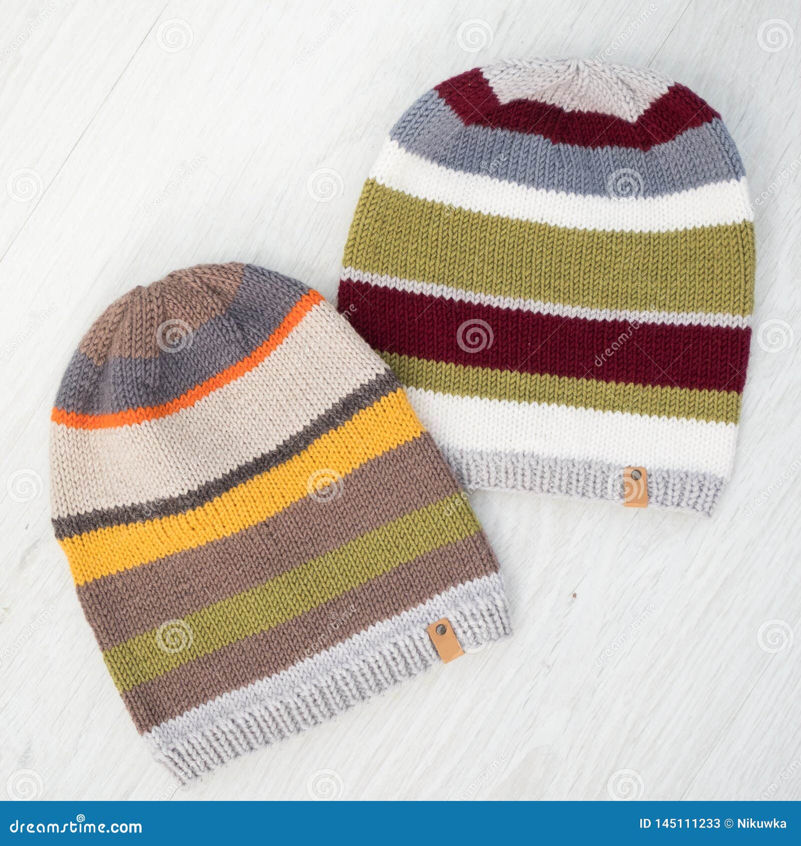 Cozy knitted set of hats stock image. Image of headwear - 145111233