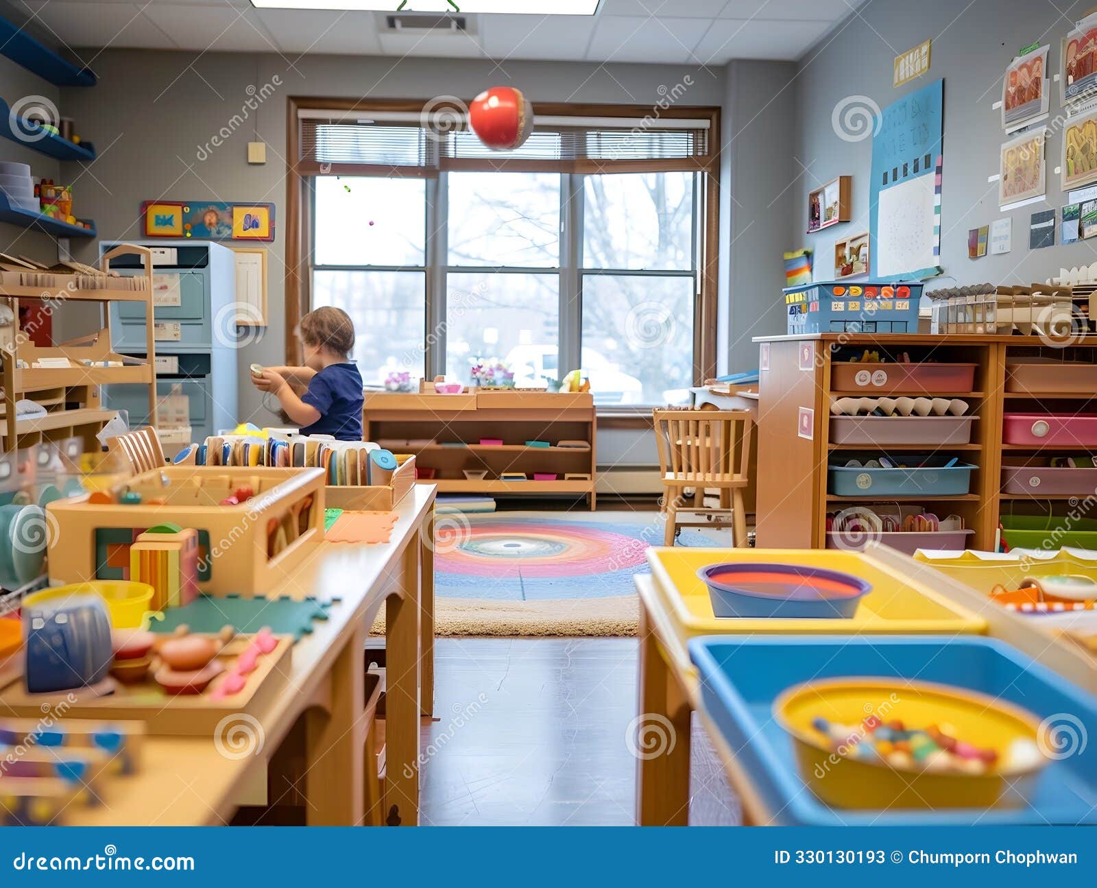 Cozy Montessori Classroom Filled with Curious Young Students Engaged in ...
