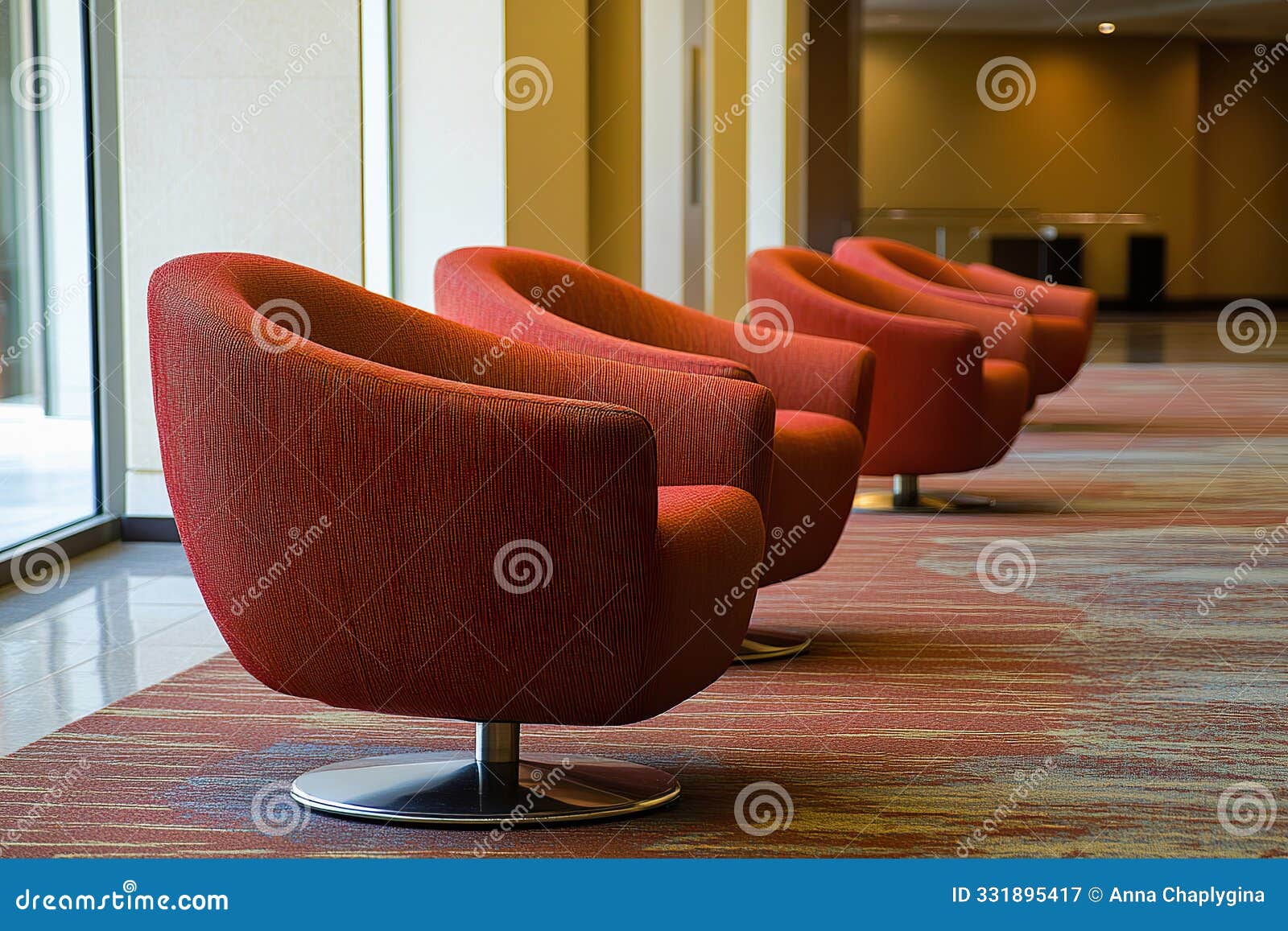 Cozy Red Chairs Raised on Glides in a Modern, Well Lit Lounge Stock ...