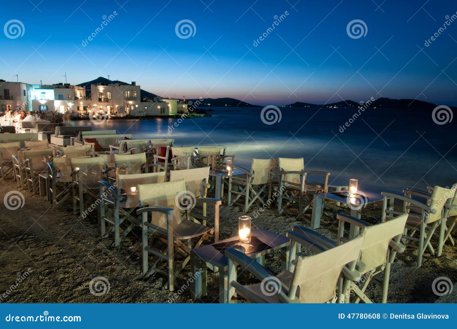 Cozy Restaurant at Night in Naussa, Paros Stock Photo - Image of light ...