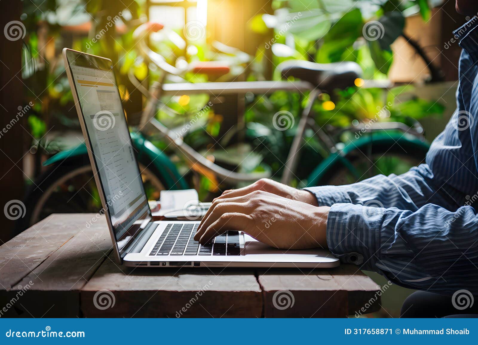 Cozy Work Environment with Laptop, Greenery, Soft Lighting, and Bicycle ...