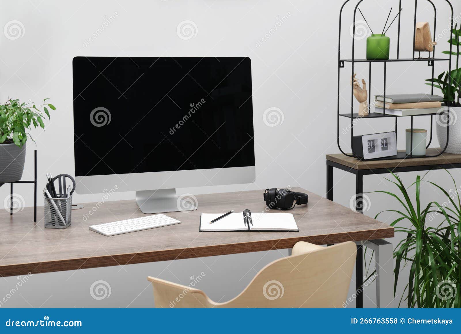 Cozy Workspace with Computer on Desk Near White Wall at Home Stock ...