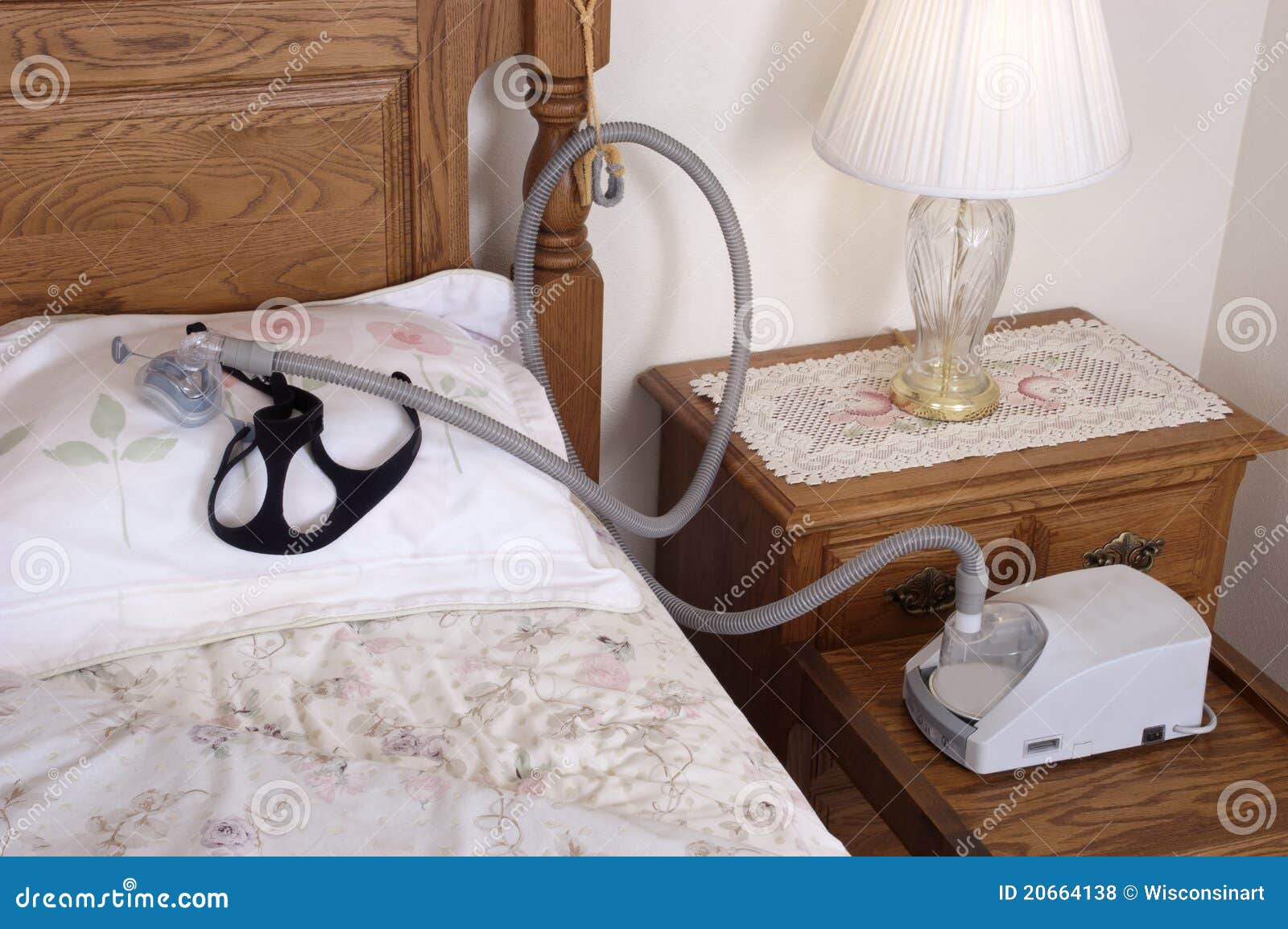 CPAP Sleep Apnea Machine Lying on Bed in Bedroom Stock Photo - Image of ...