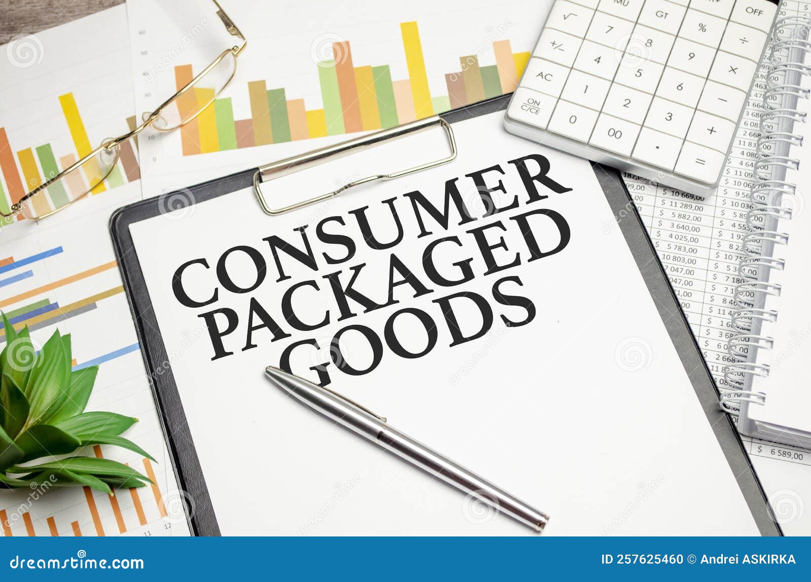 CPG - Consumer Packaged Goods Text Written on Paper Folder and Charts ...