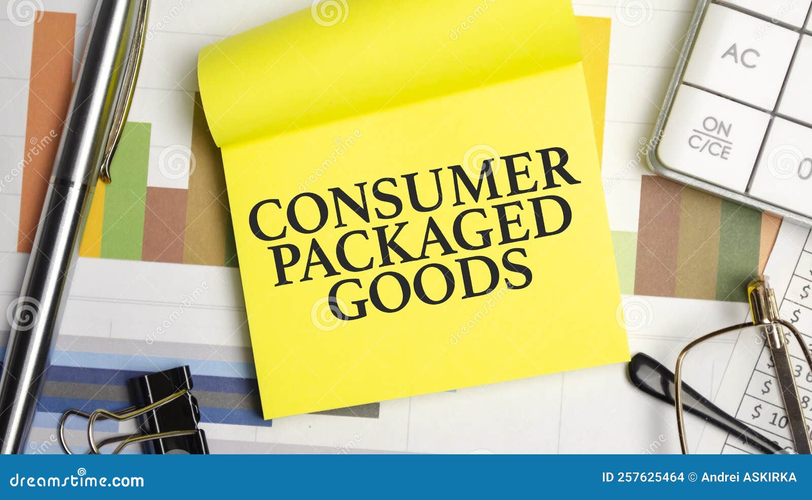 CPG - Consumer Packaged Goods Text on the Yellow Paper with Pen and ...