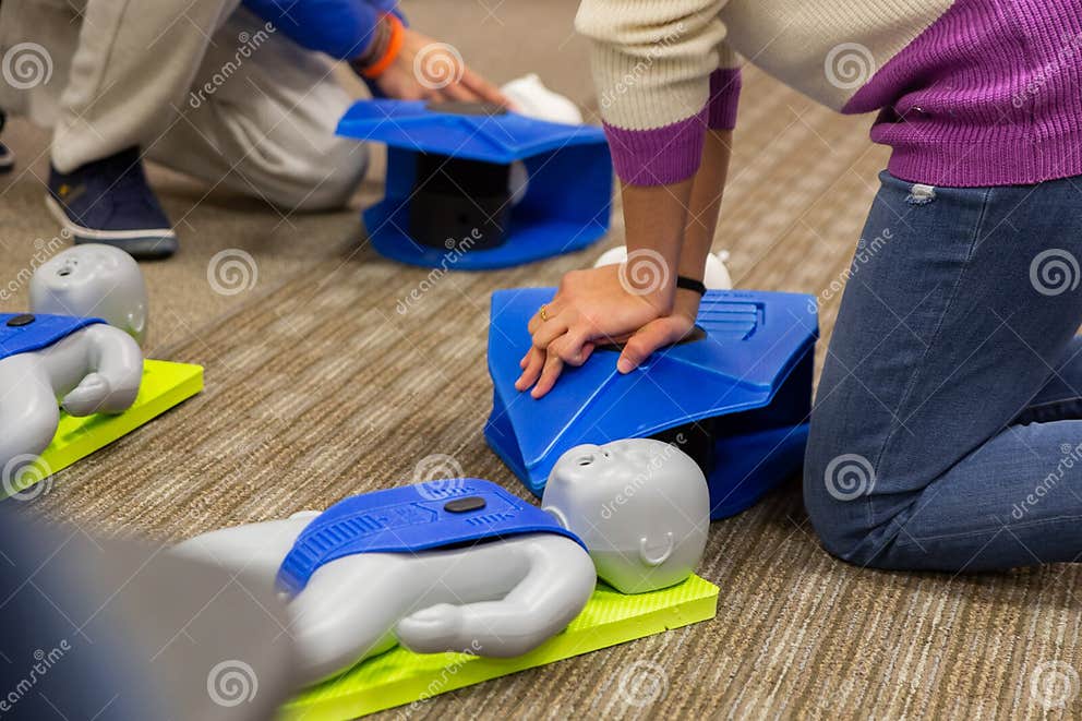 CPR Training Class by Security Guard in Office Stock Photo - Image of ...