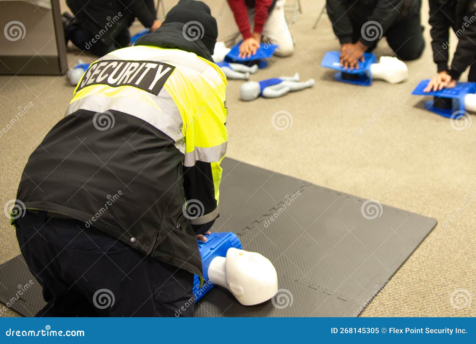 CPR Training Class by Security Guard in Office Stock Image - Image of ...