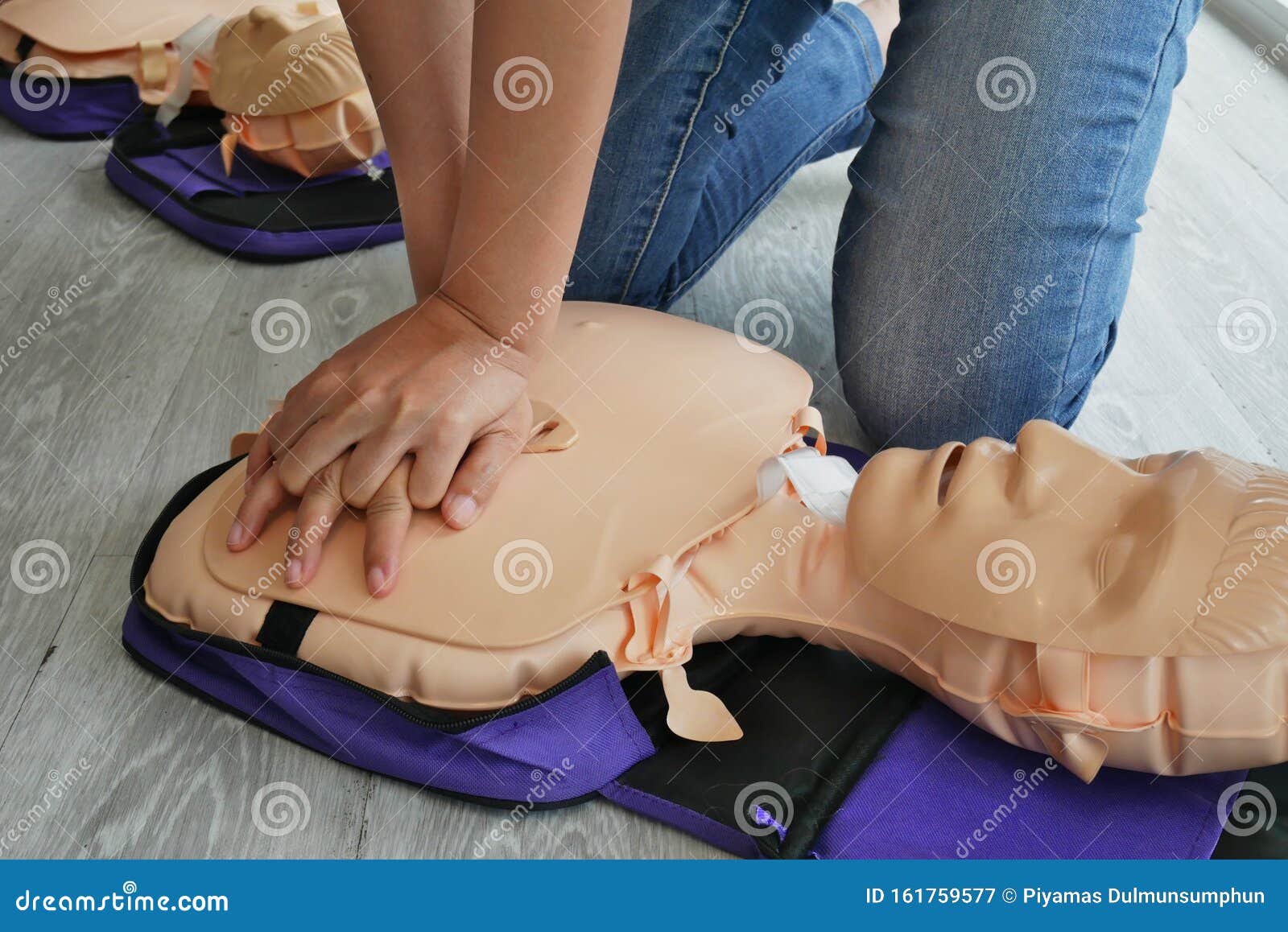 Cpr Training. Close-up of Trainee`s Hand Pump on Chest of Dummy on CPR ...