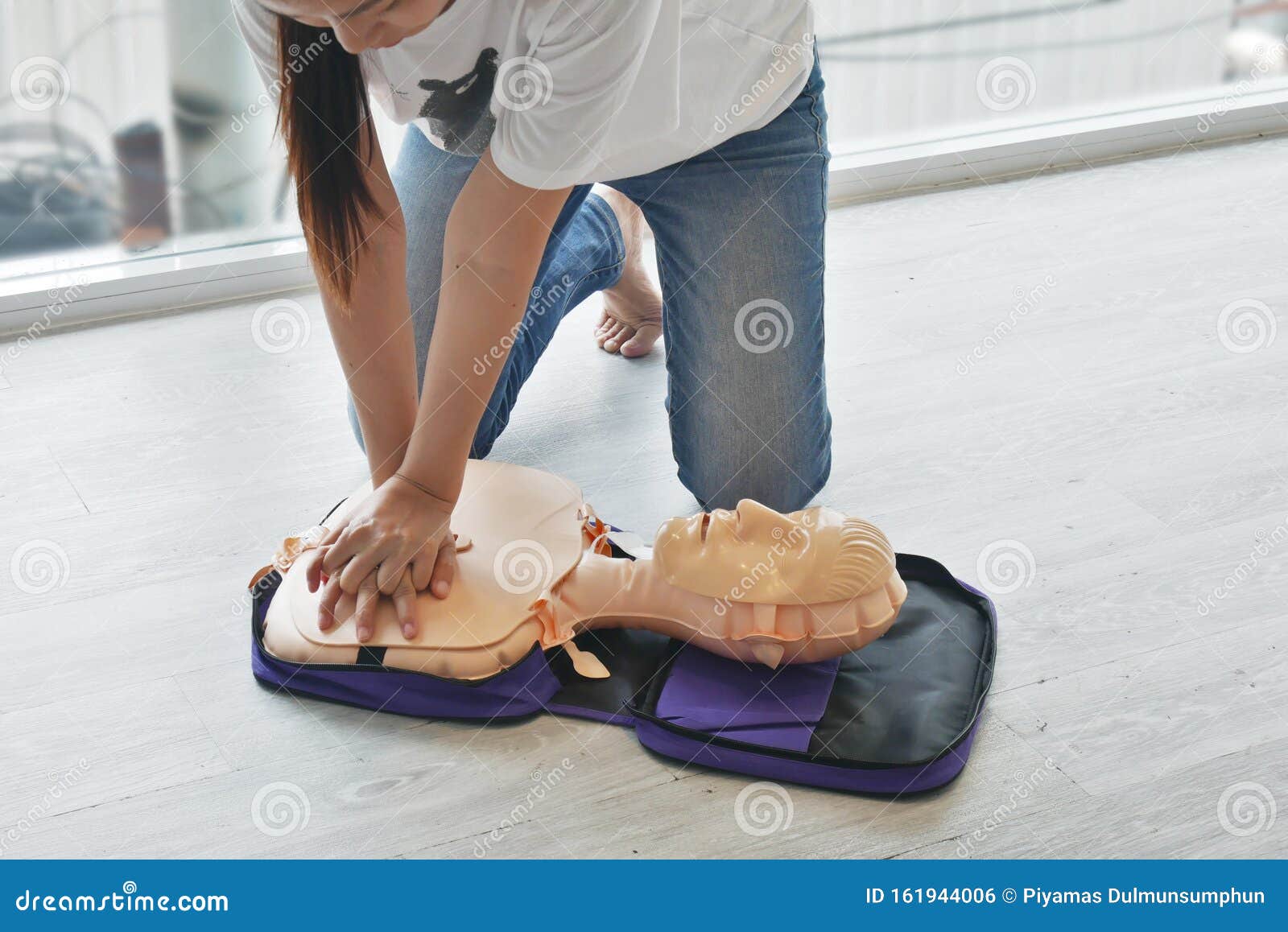 Cpr Training. Close-up of Trainee`s Hand Pump on Chest of Dummy on CPR ...