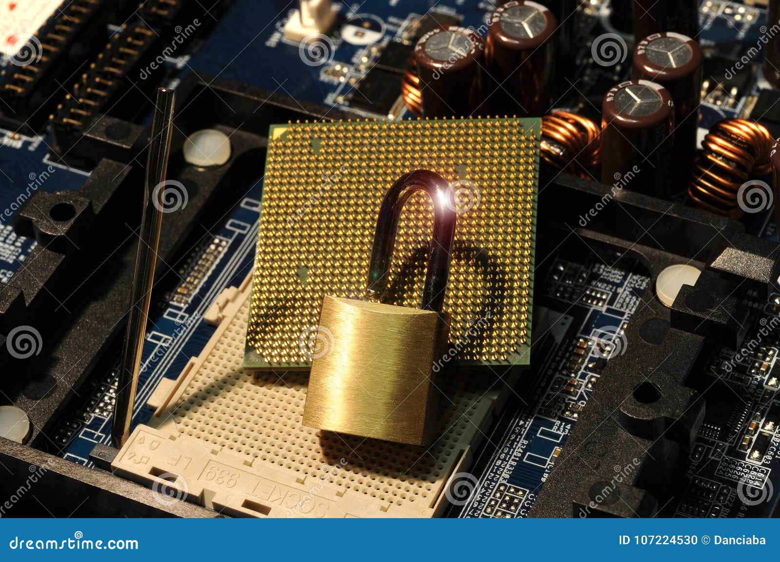 CPU Computer Processor Over Motherboard and Padlock. Stock Photo ...
