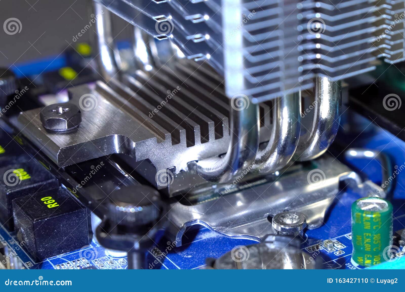 CPU Cooling System. Cooler with Radiator on the Motherboard Stock Photo ...