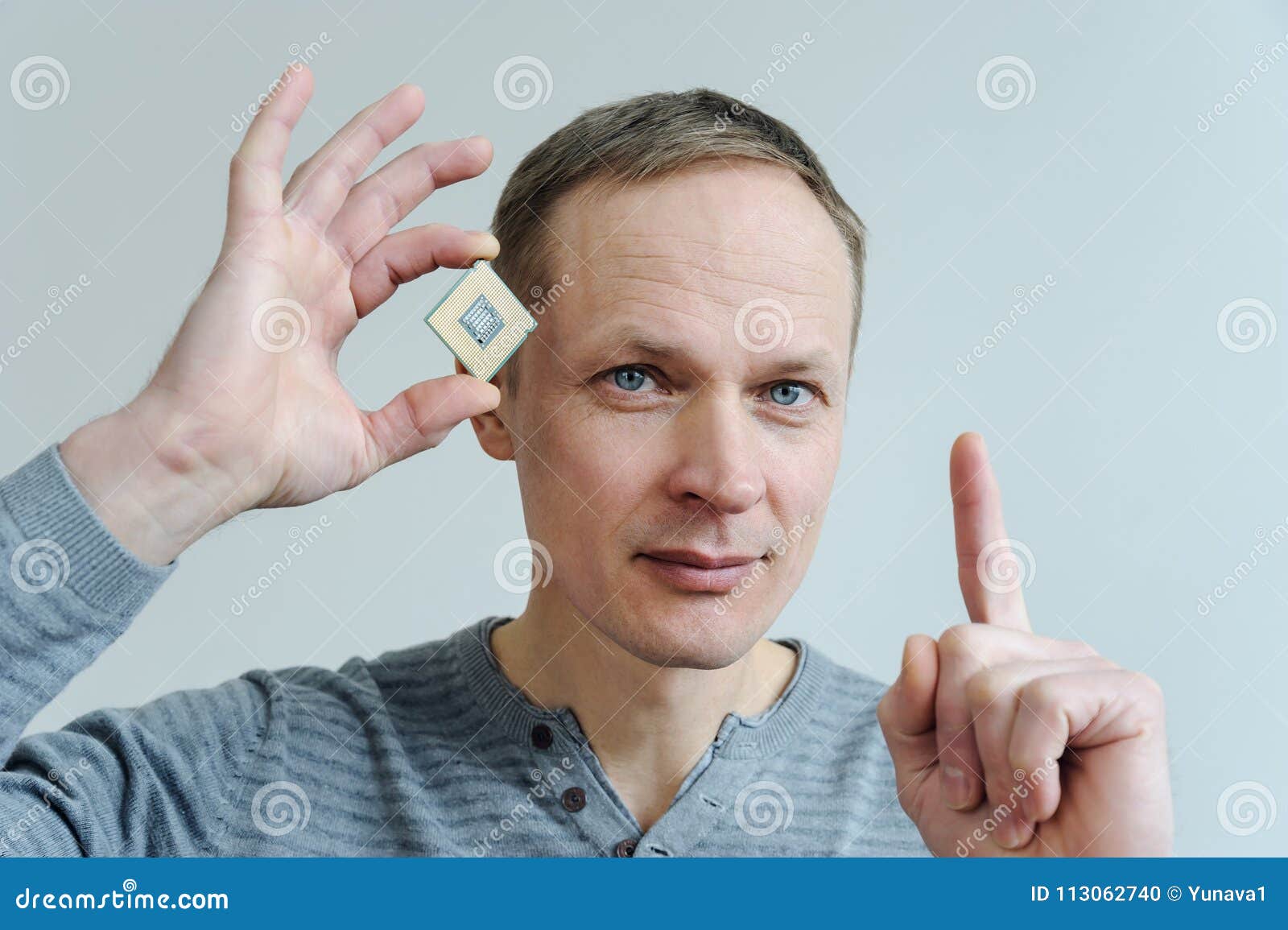 CPU in the man`s hand. stock photo. Image of hand, digital - 113062740