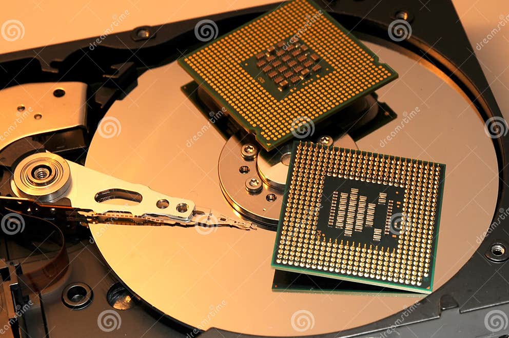 CPU Processors on Reflective Hard Disk Plate. Stock Photo - Image of ...