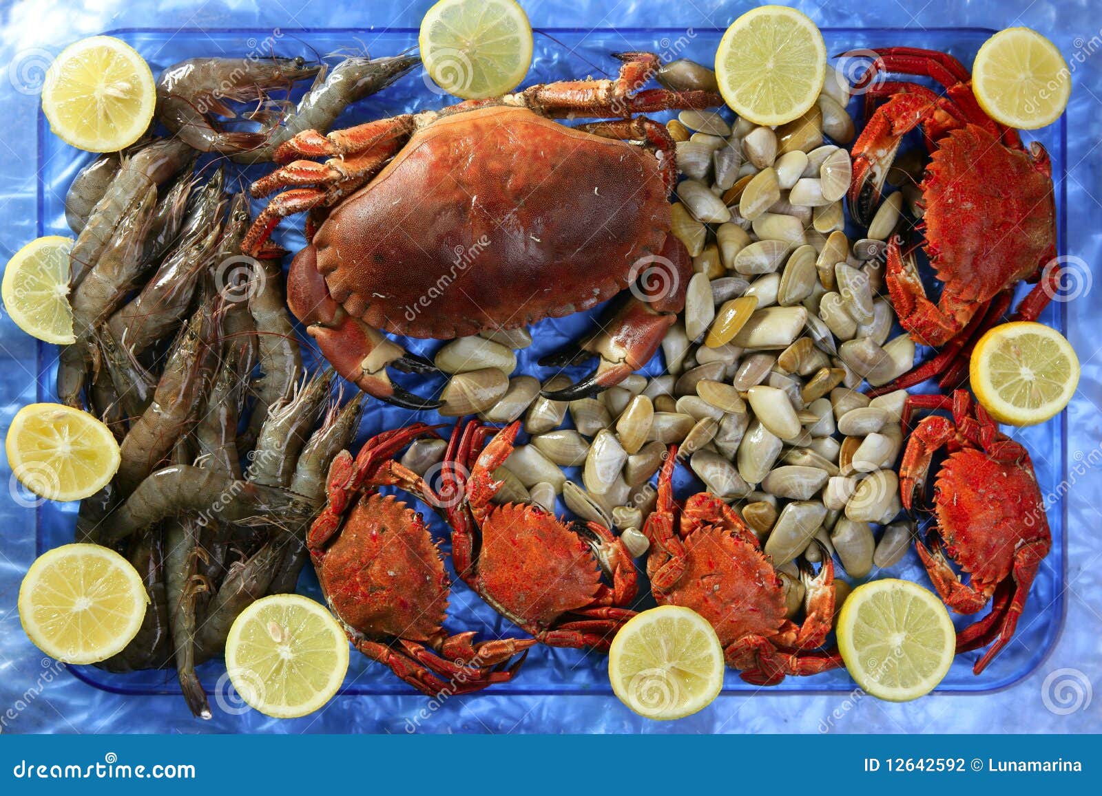 Crabs Tellin Shrimp Clams and Lemon Stock Photo - Image of gourmet ...