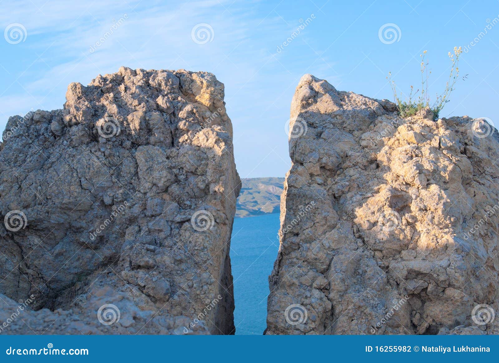 Crack In A Rock Through Which The Sea Stock Photo - Image of rock ...