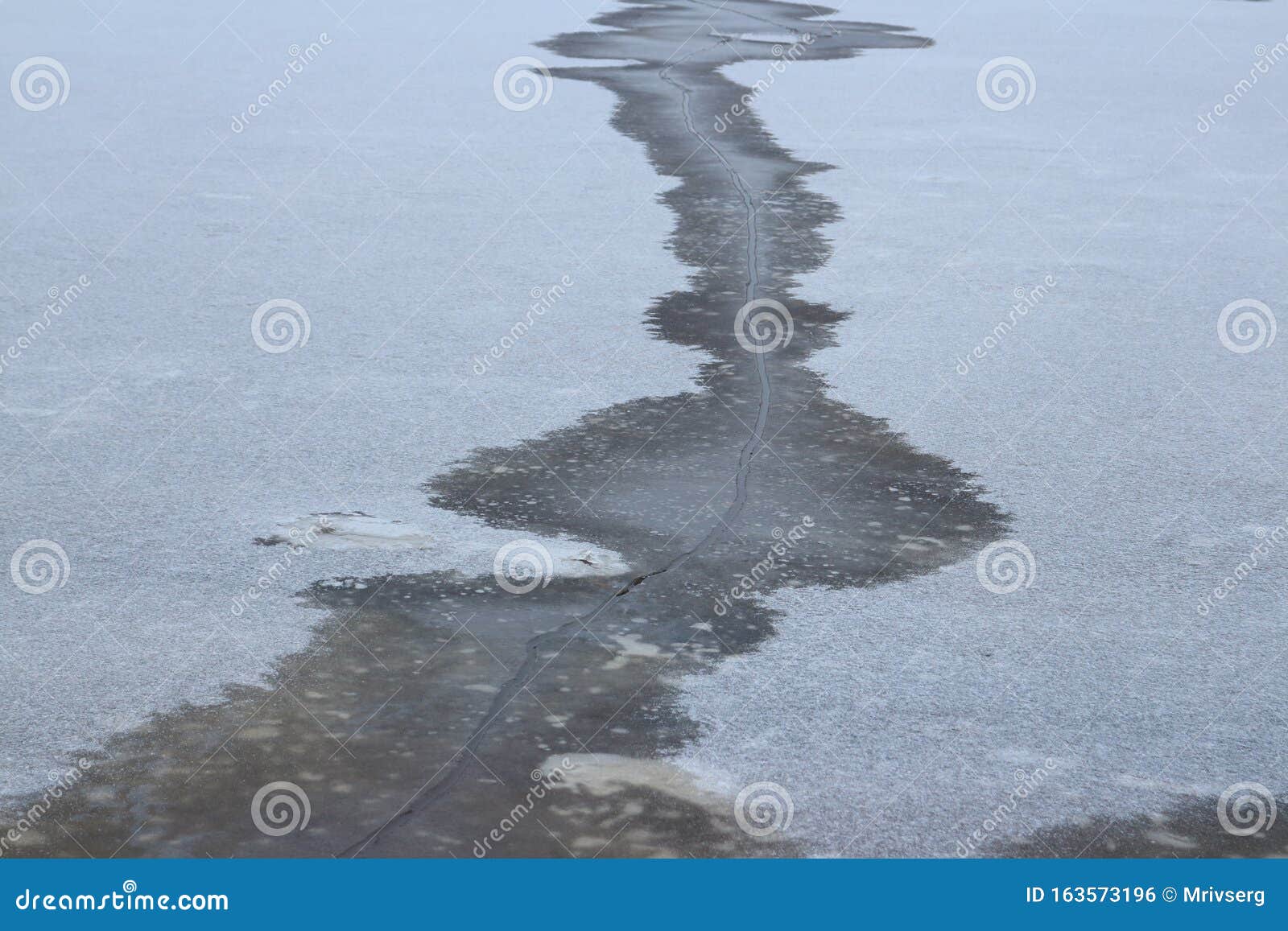 Crack on thin ice stock photo. Image of nature, crack - 163573196
