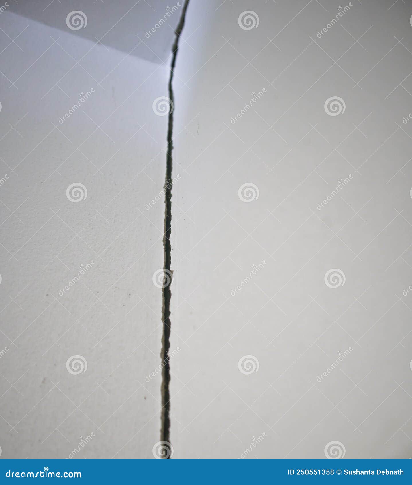 A Crack on the wall corner stock photo. Image of crack - 250551358