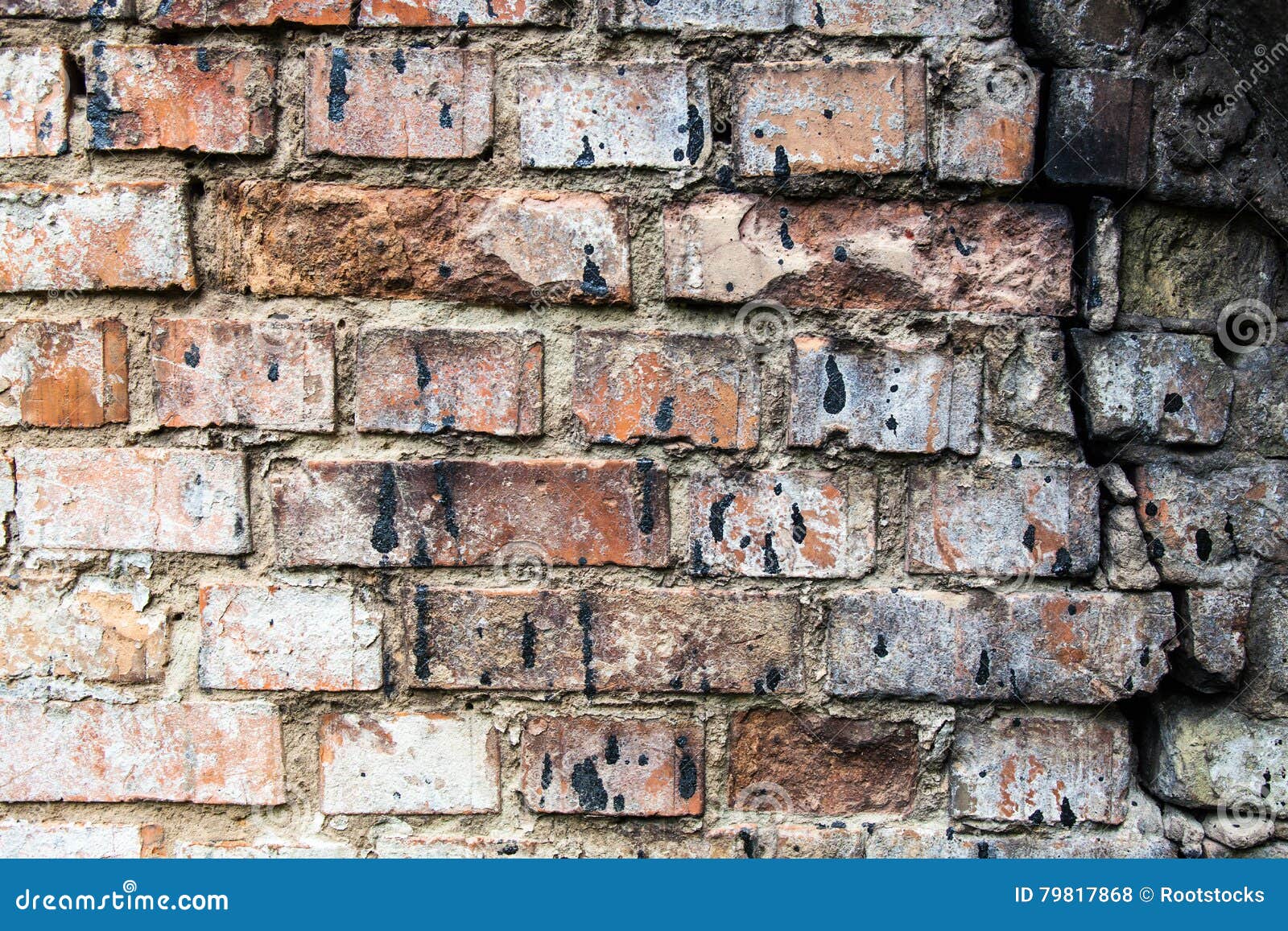Cracked Brick Wall Stained with Black Tar Stock Photo - Image of orange ...