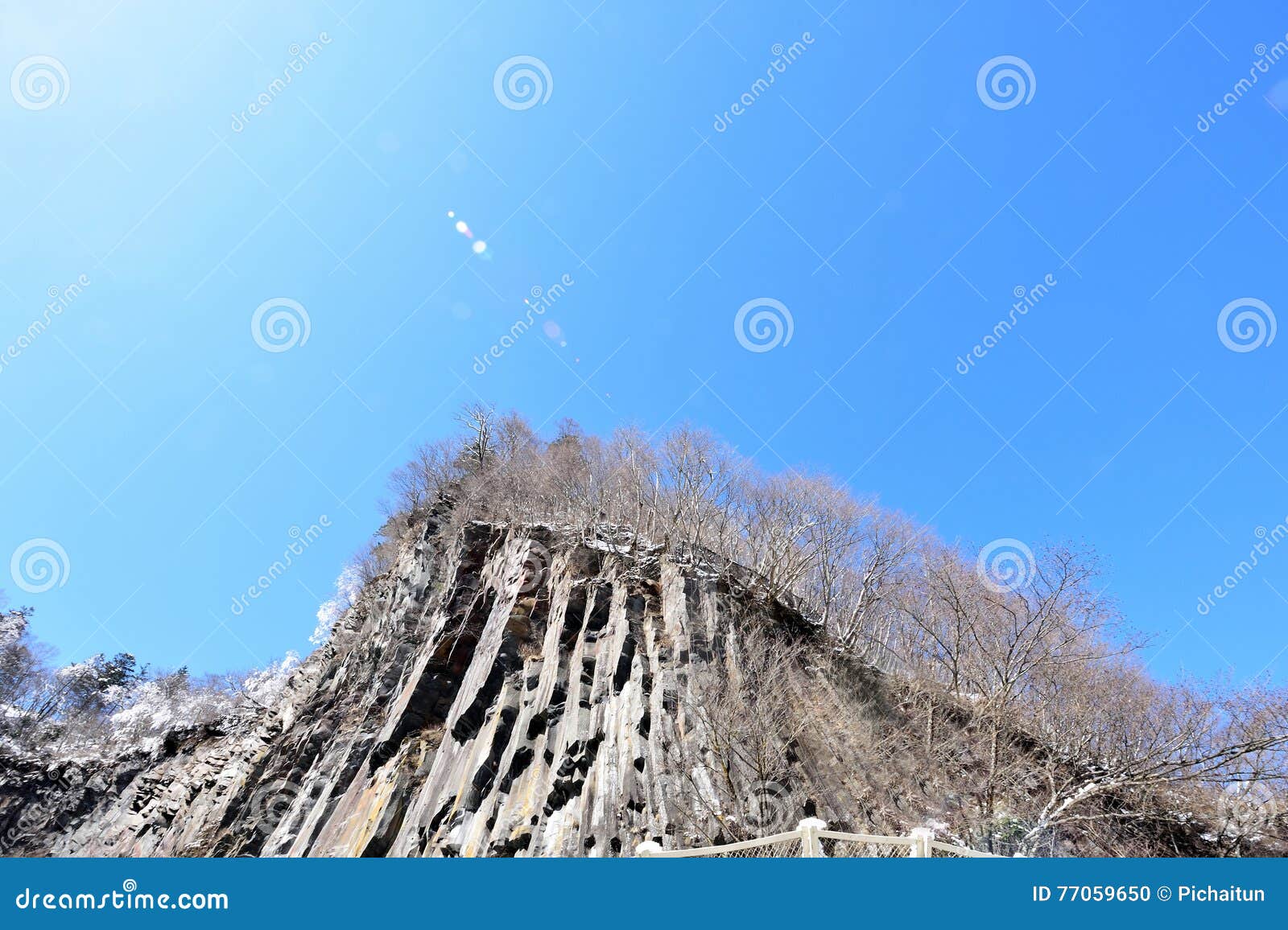 Cracked cliff stock photo. Image of season, nikko, flows - 77059650