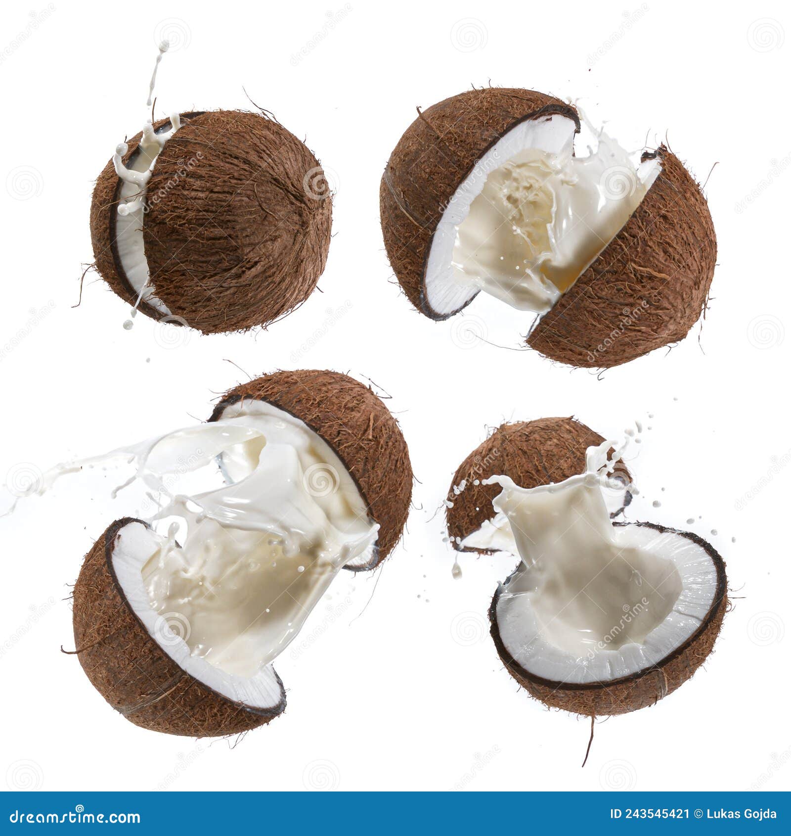 Cracked Coconut with Milk Splash Flying in the Air. Stock Image - Image ...