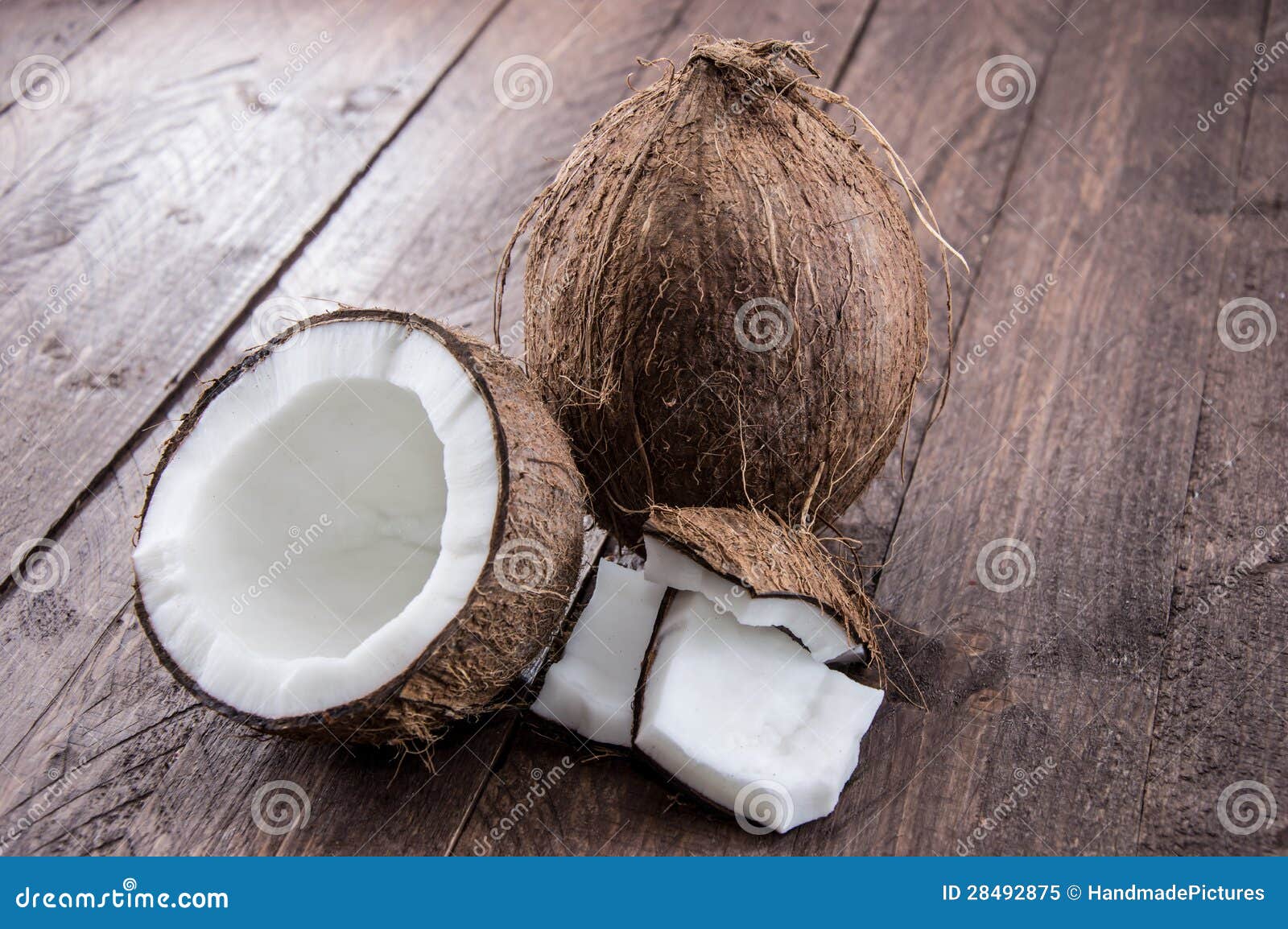 Cracked Coconut on wood stock image. Image of food, nutrition - 28492875