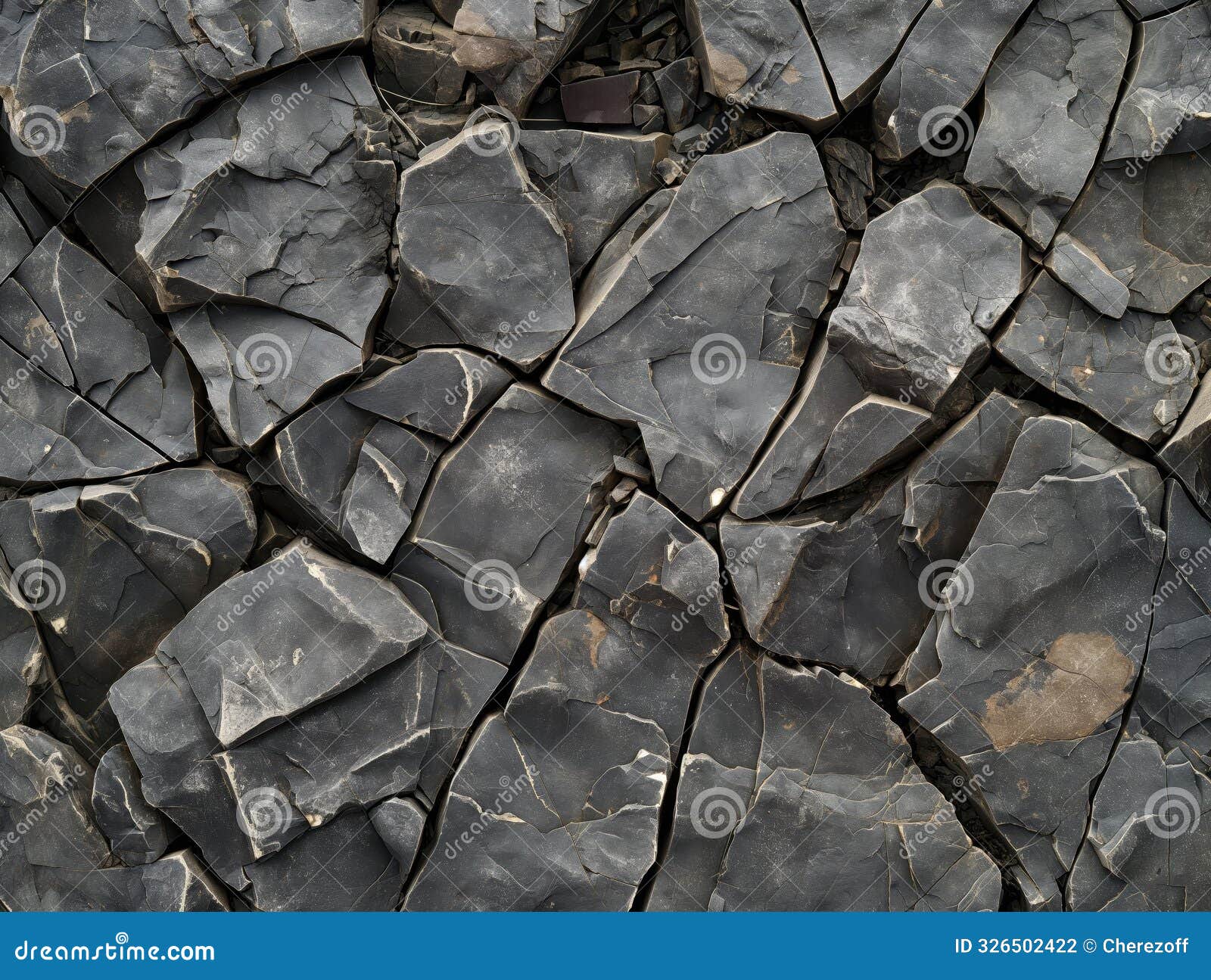 Cracked Dark Rocks stock photo. Image of dark, rugged - 326502422
