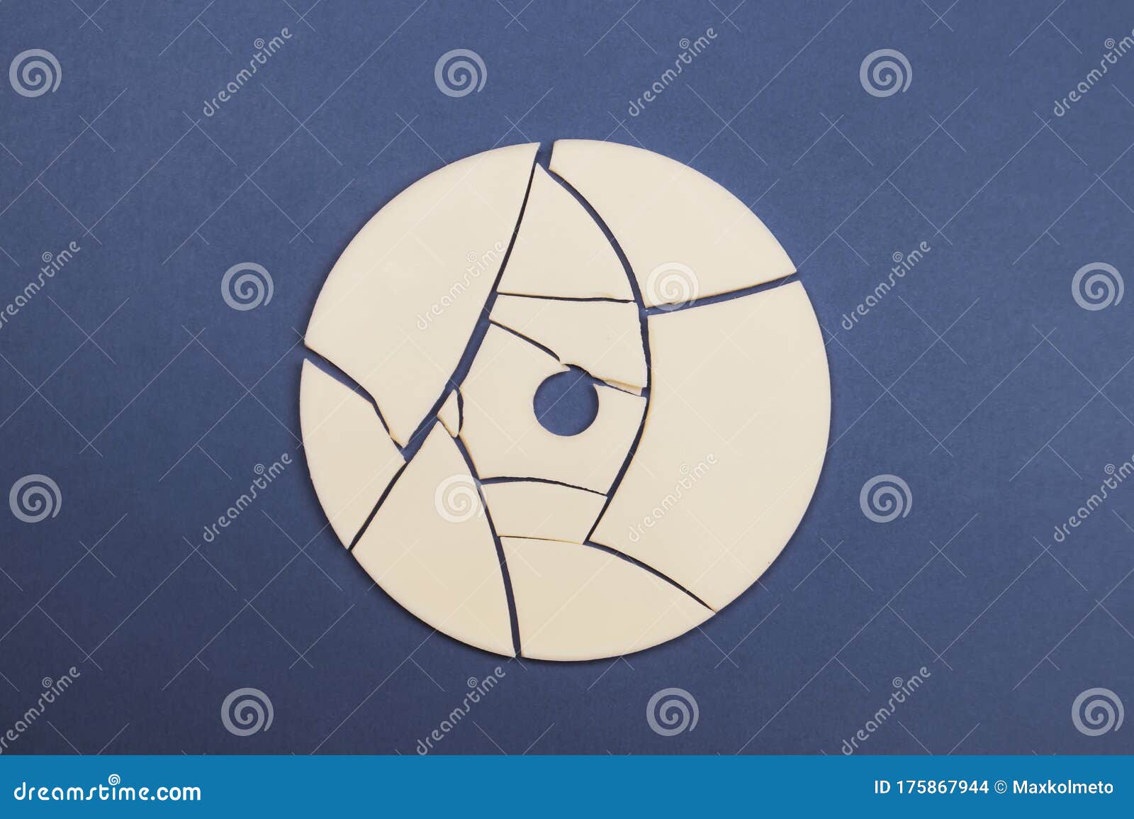 Pieces of Broken Disc on Color Background Stock Photo - Image of ...