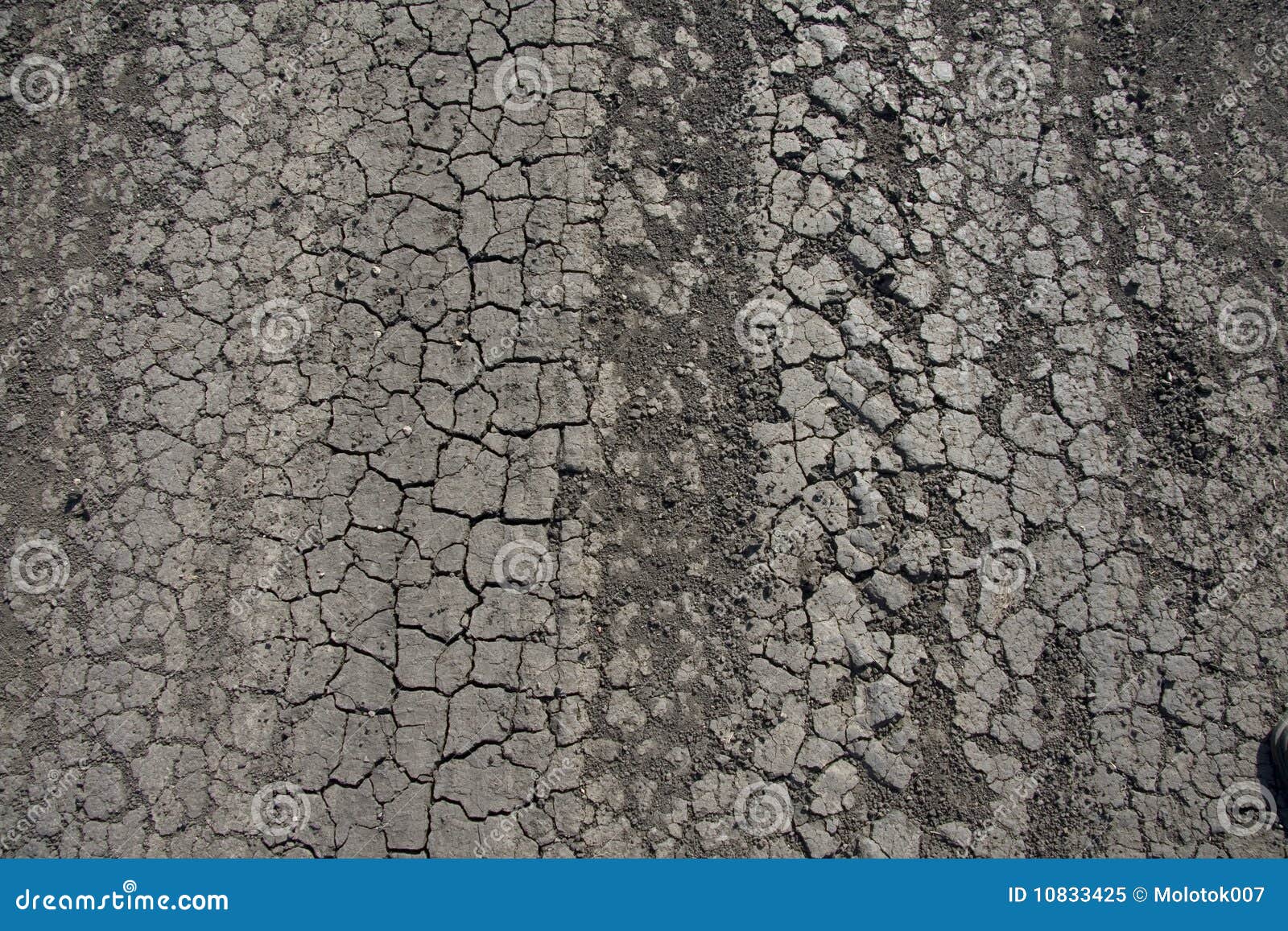 Cracked earth on road stock image. Image of grunge, dirt - 10833425
