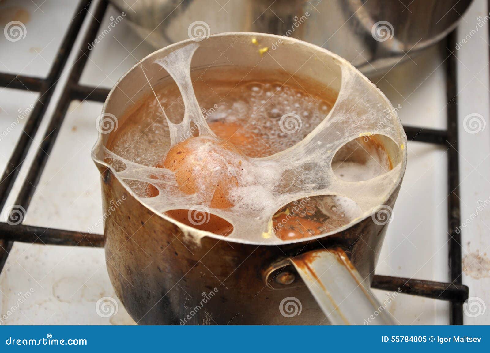 Cracked Eggs Boiling in Saucepan Stock Image - Image of creepy, boiling ...