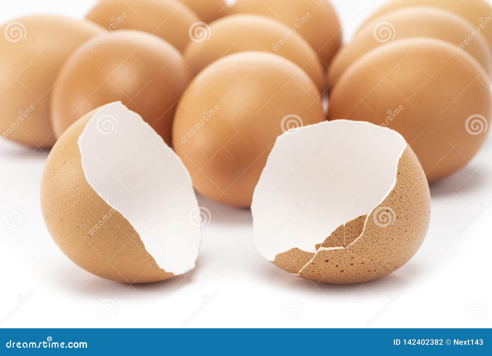 A Cracked and Open Egg in Front of Other Eggs Stock Photo - Image of ...