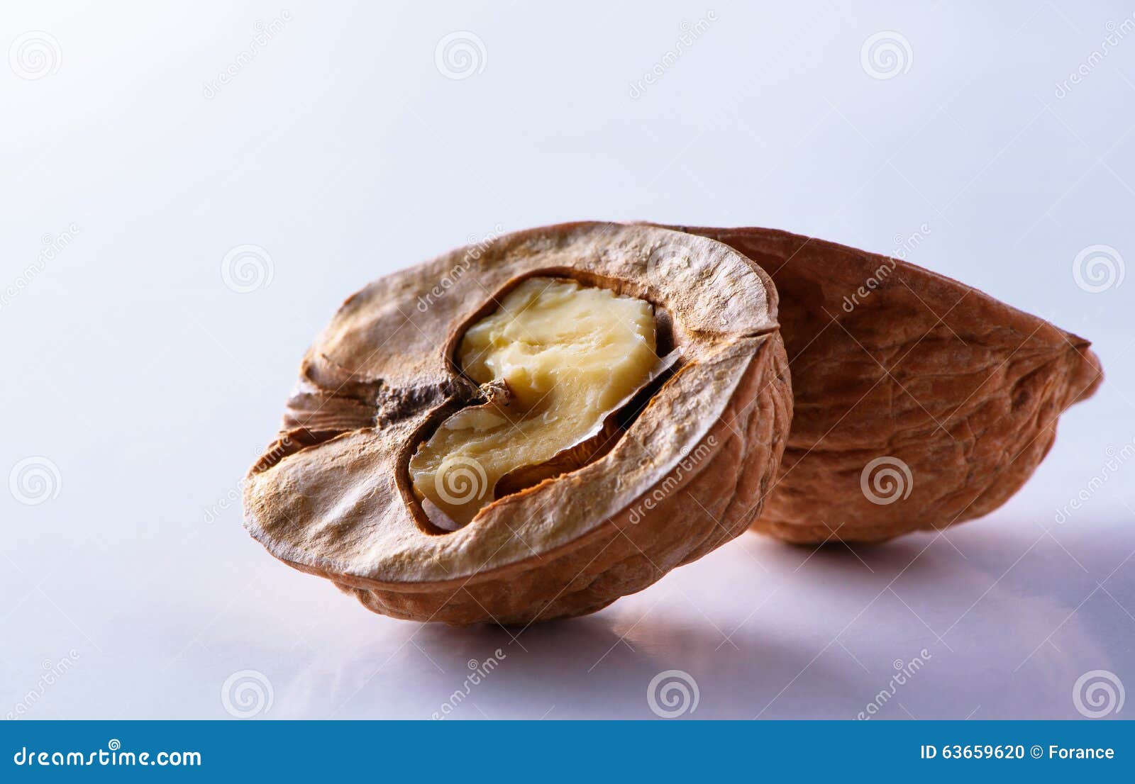 Cracked Open Walnut on White Desk Stock Photo - Image of nutshell, diet ...
