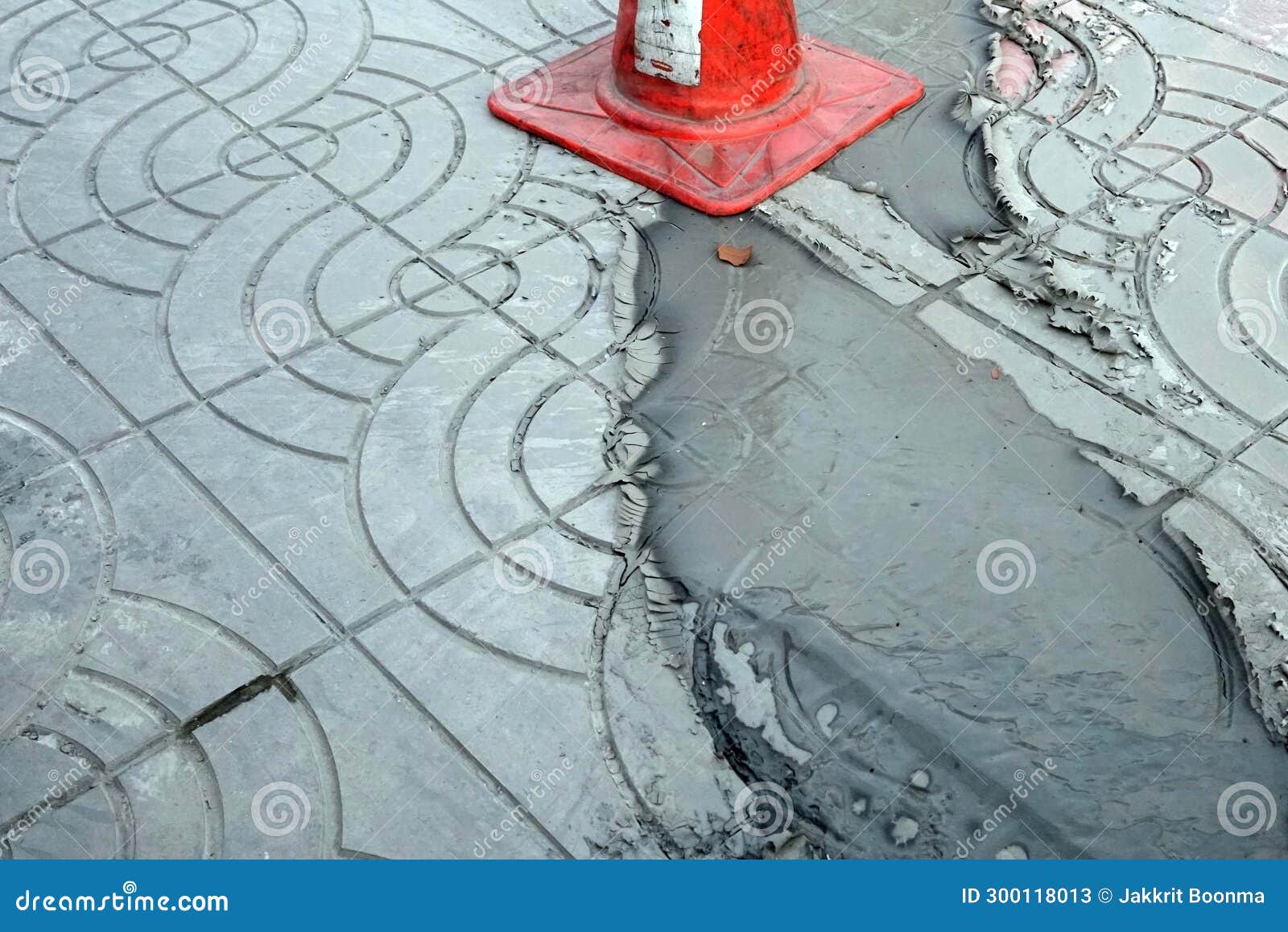 Cracked Pavement with a Red Traffic Cone, Constructions Concepts Stock ...