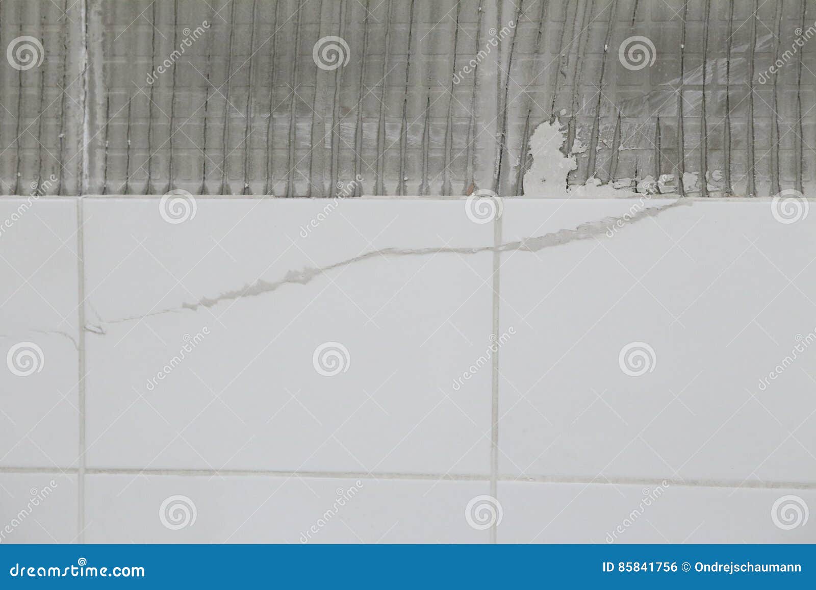 Cracked and Repaired Tiles with Gray Comb Background Stock Photo ...