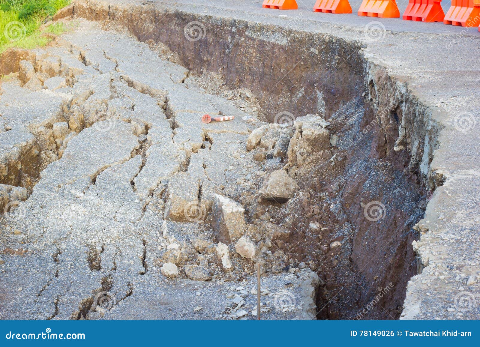 Cracked Road after Earthquake with Yellow Barricade. Stock Photo ...