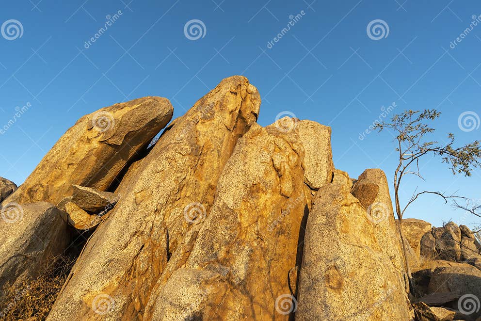 Cracked rocks in Namibia stock photo. Image of sunny - 165427082