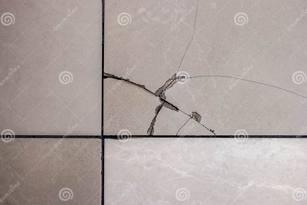 Broken tile on the floor stock image. Image of textured - 186041603