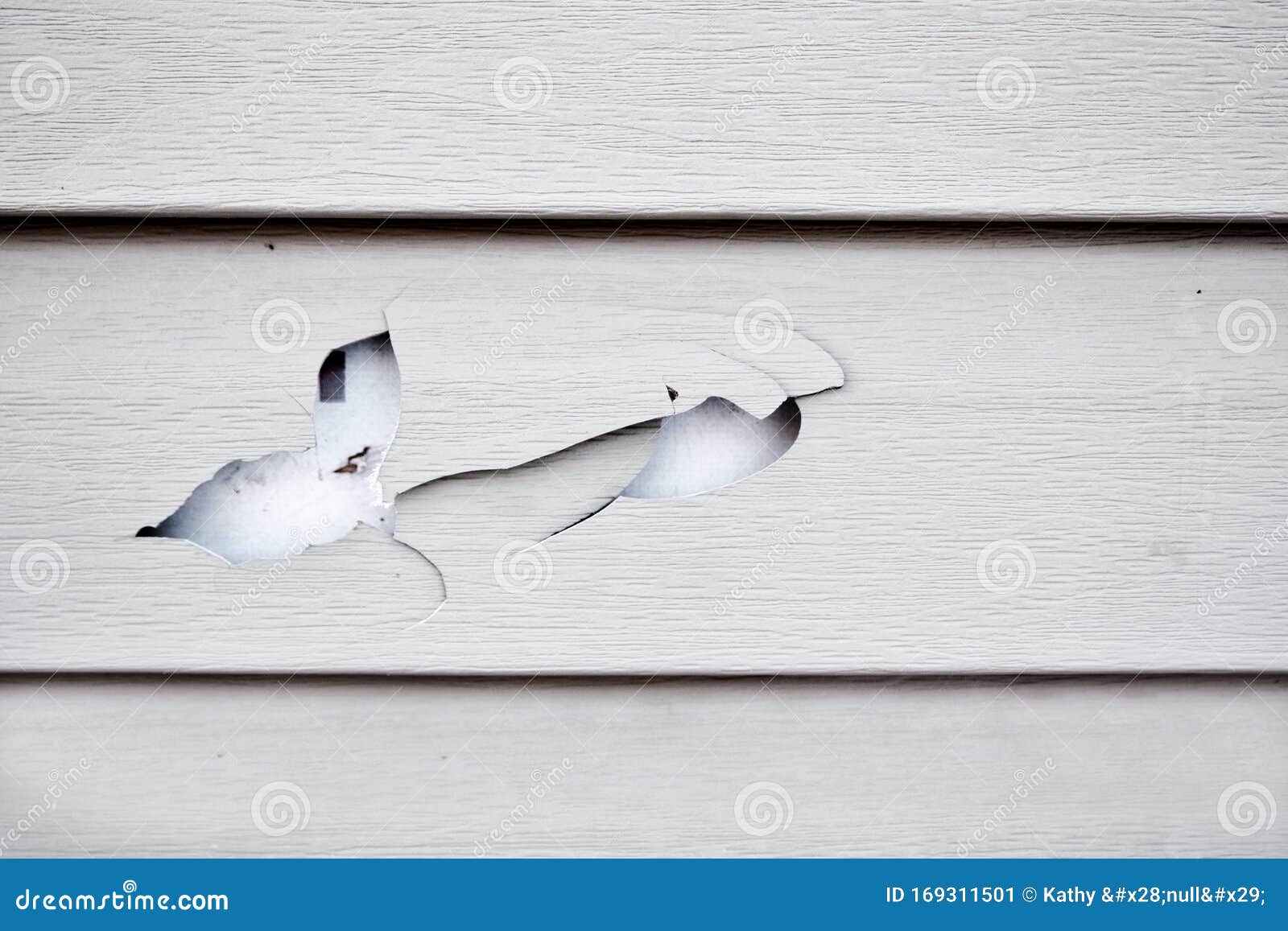 Cracked Vinyl Siding on a House Stock Image - Image of damaged ...