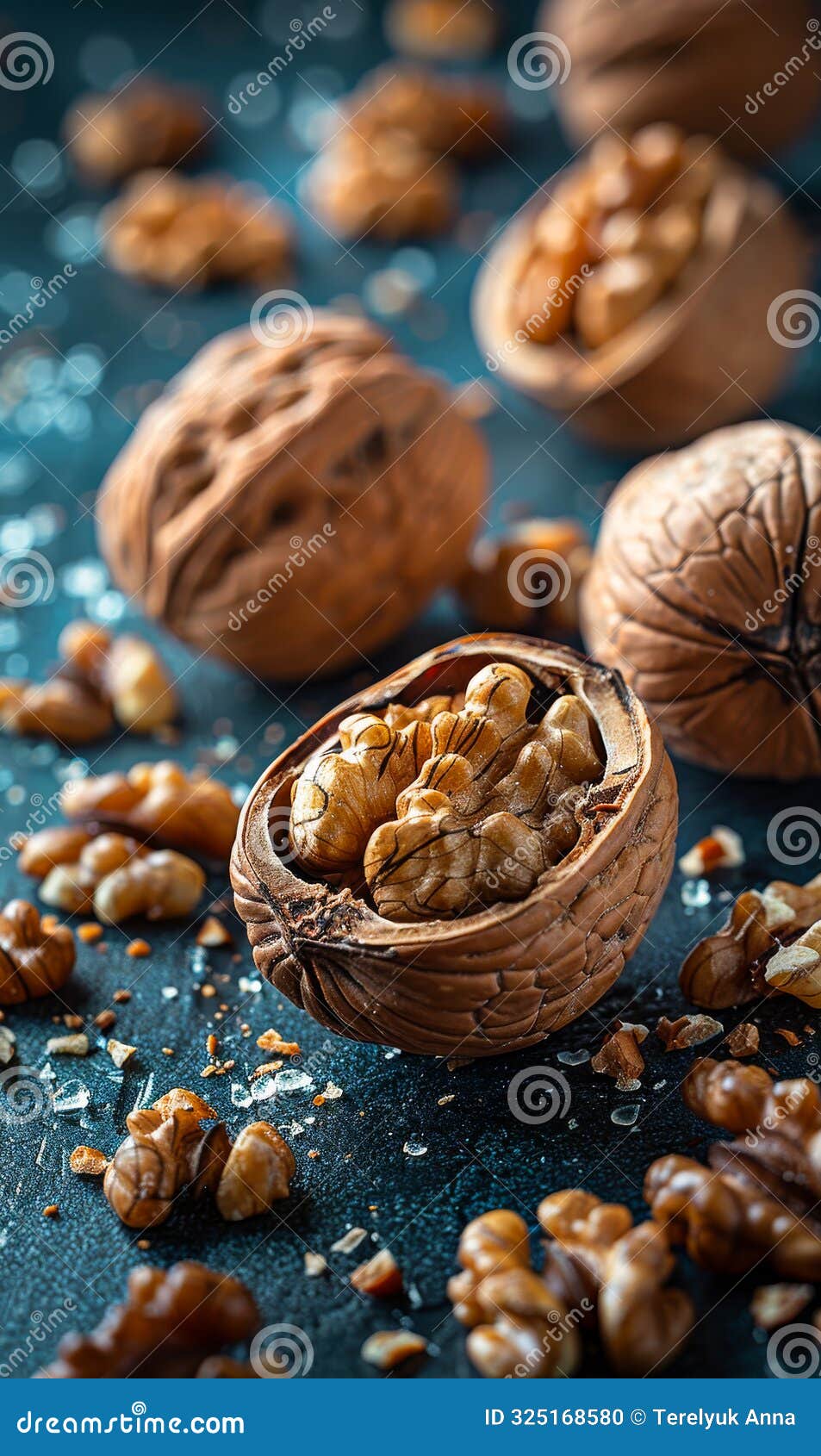 Cracked Walnut on Blue Background. a Close-up View of a Cracked Walnut ...
