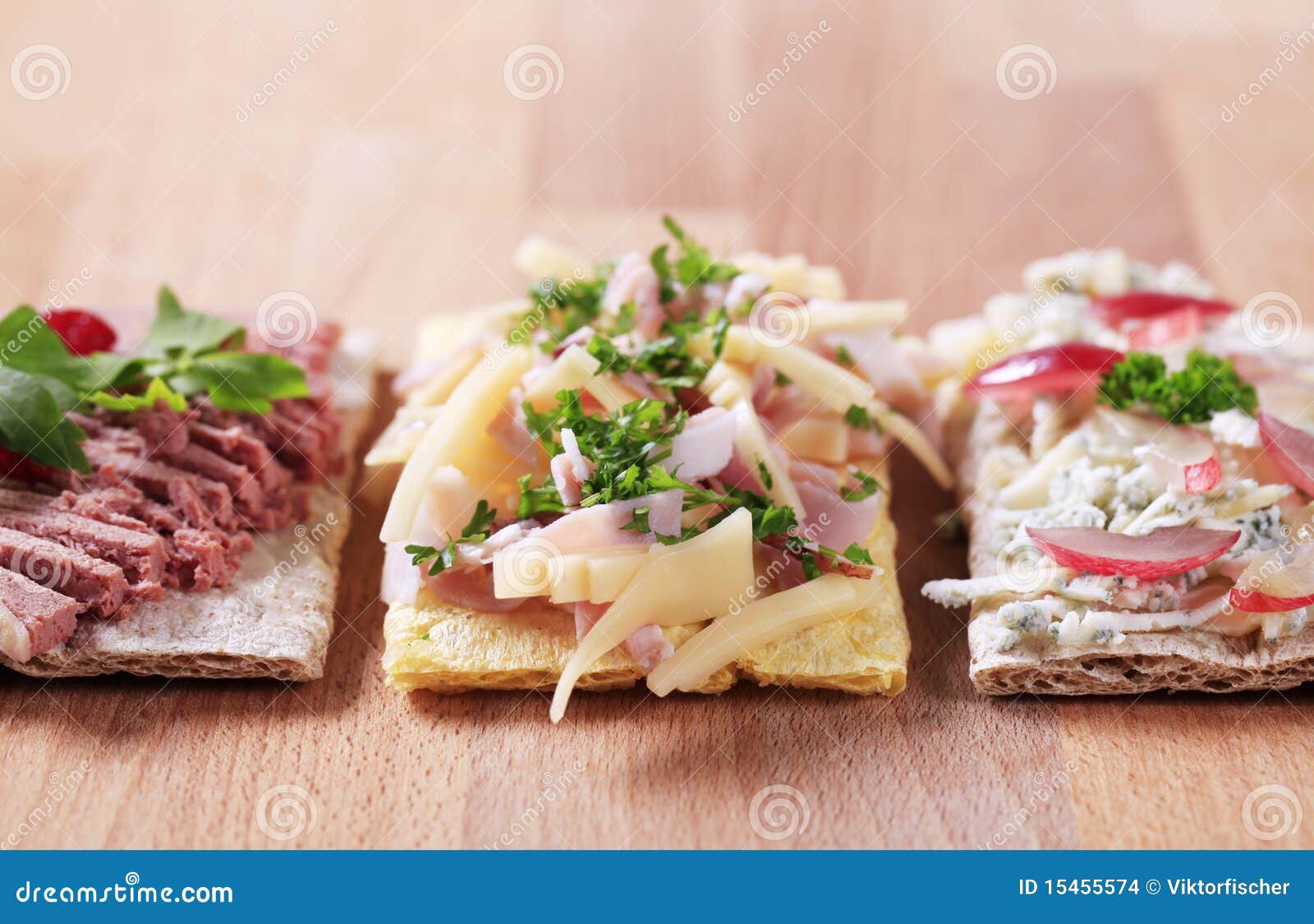 Crackers with Different Toppings Stock Photo - Image of variety, blue ...