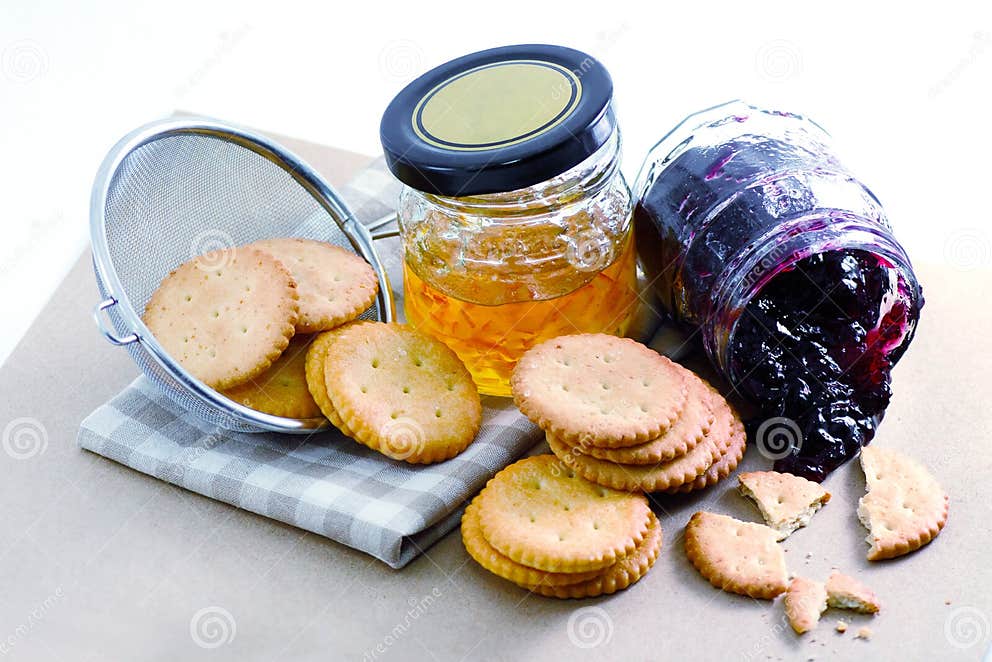 Crackers with Orange Jam and Blueberry Jam Stock Photo - Image of ...