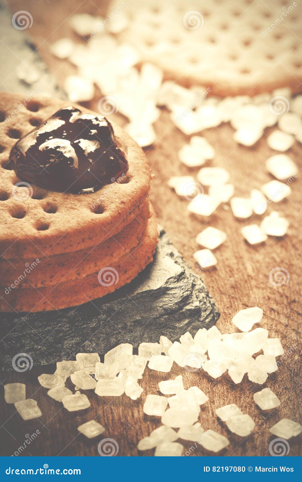 Crackers Stack Together with Jam on Top on Black Stone, Coarse S Stock ...