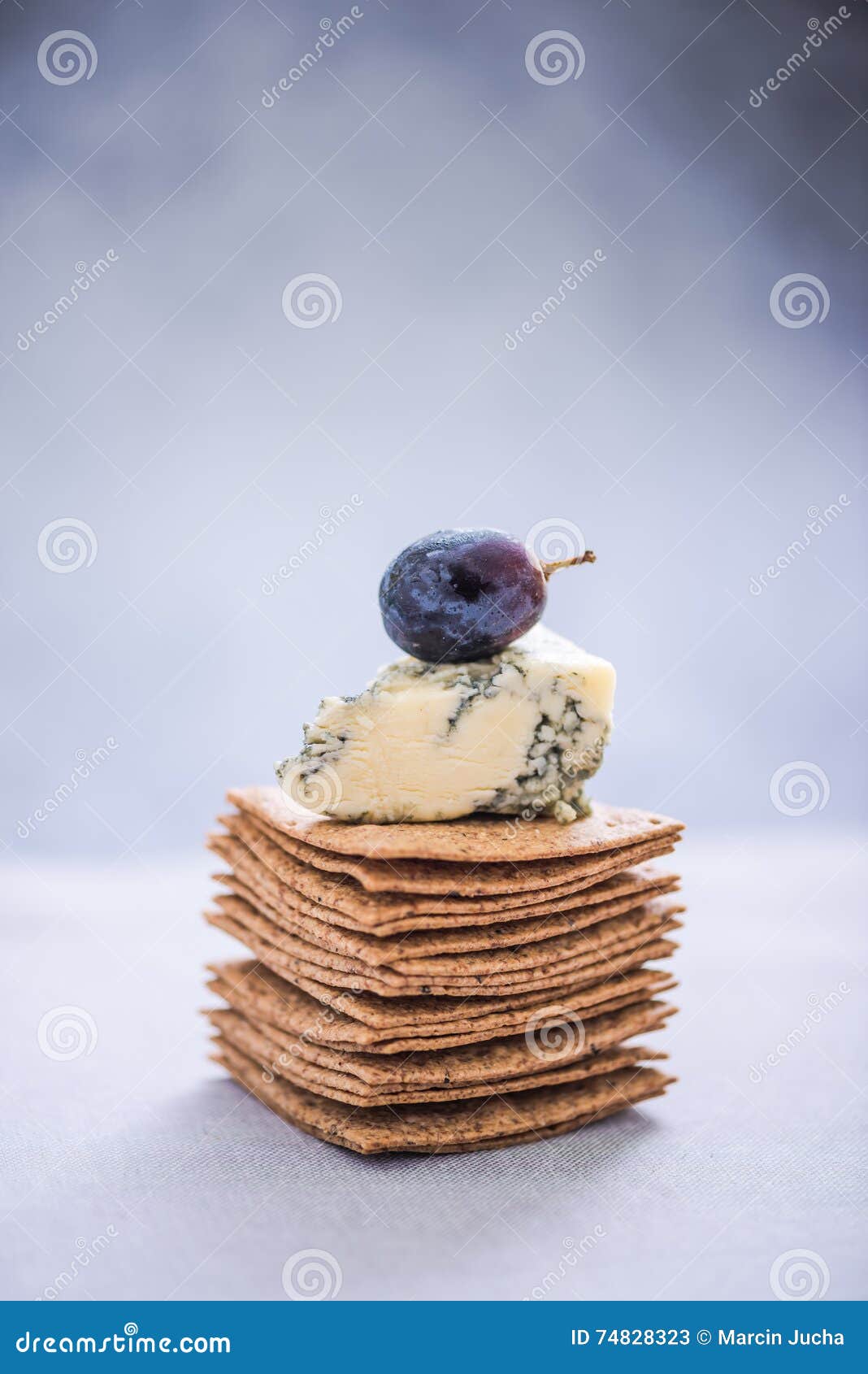 Crackers Stack Topped with Brie Cheese and Grape Stock Image - Image of ...