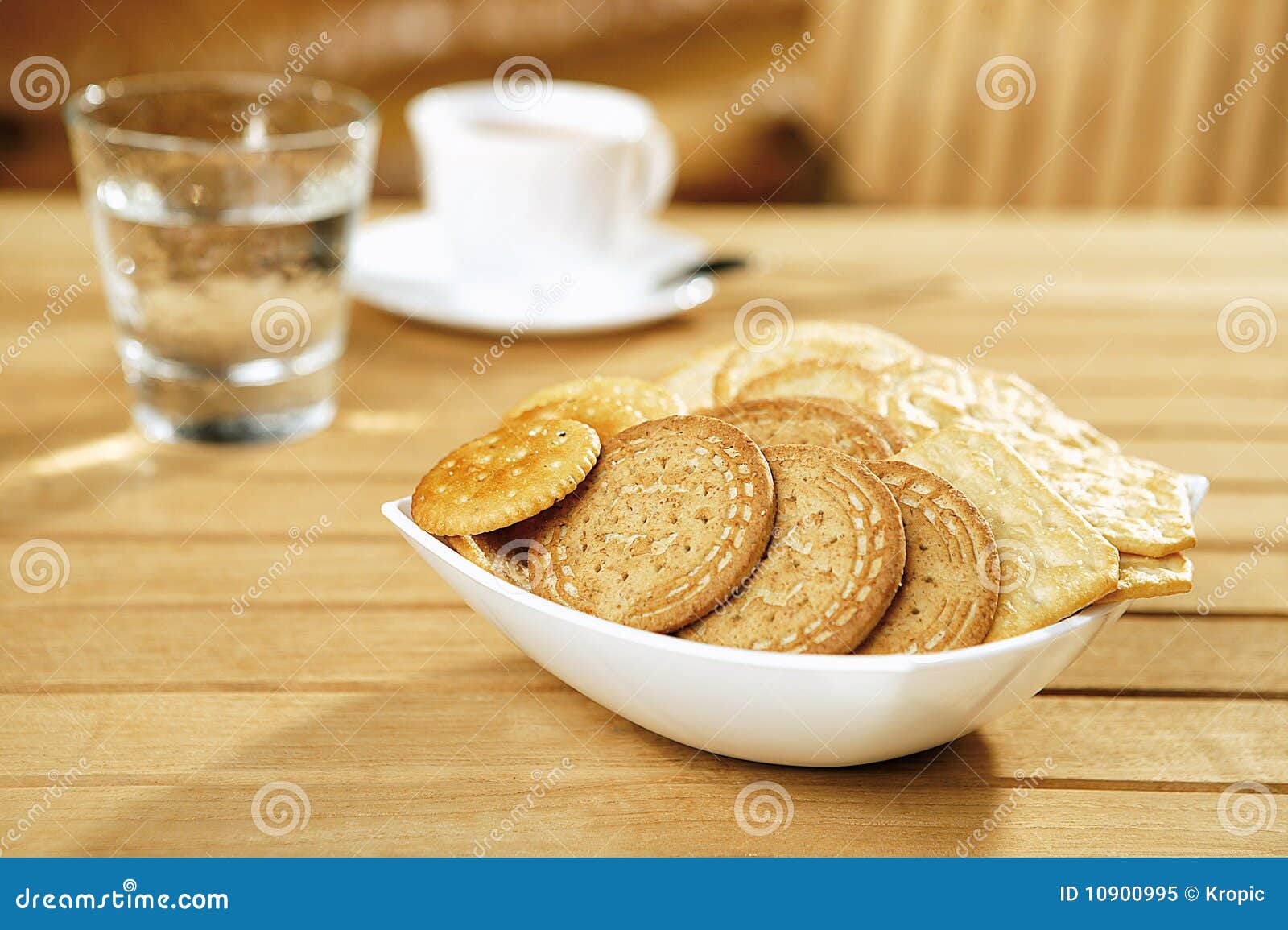 Crackers on a wooden table stock image. Image of crackers - 10900995