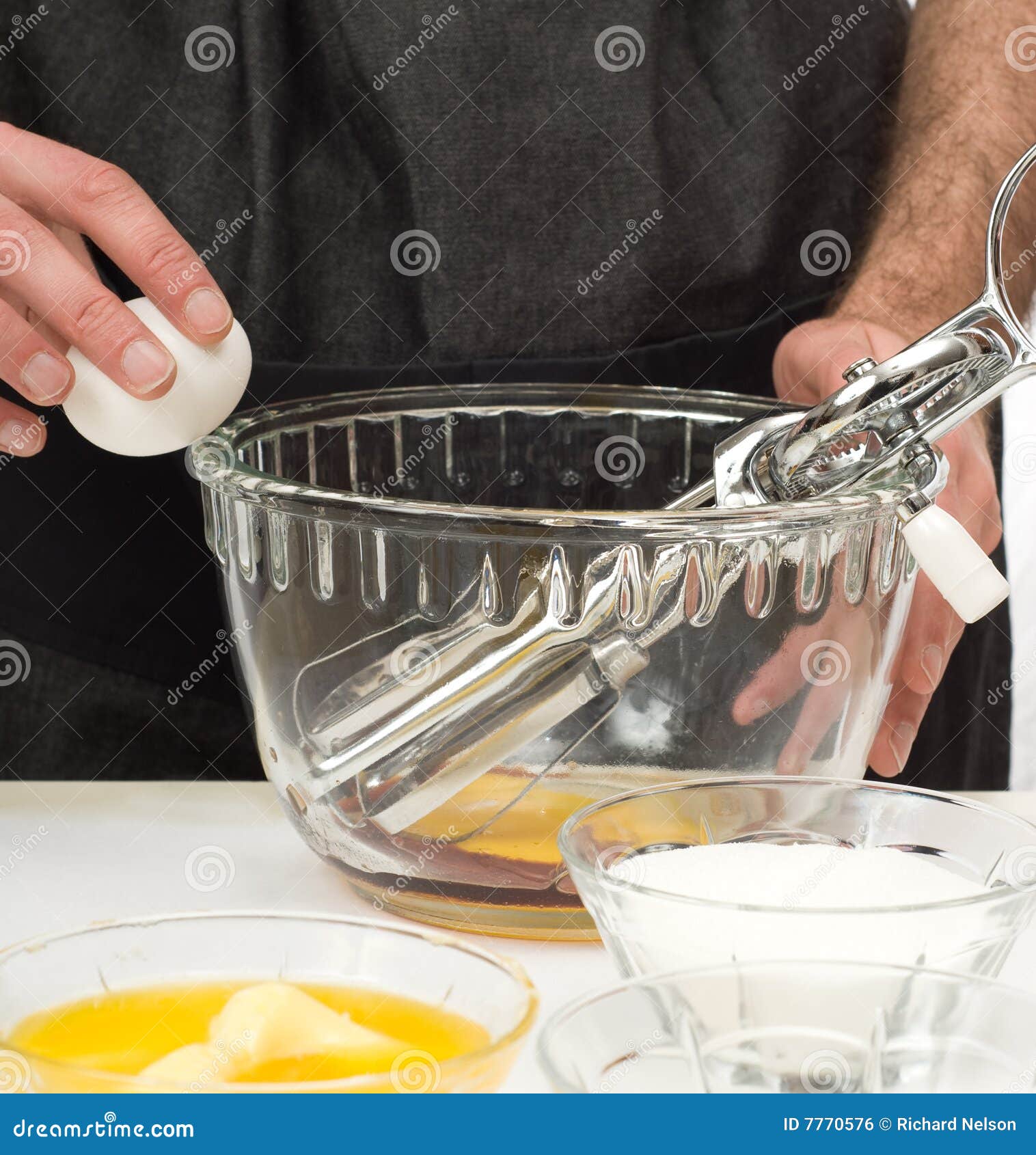 Cracking an Egg stock photo. Image of silver, break, kitchenware - 7770576