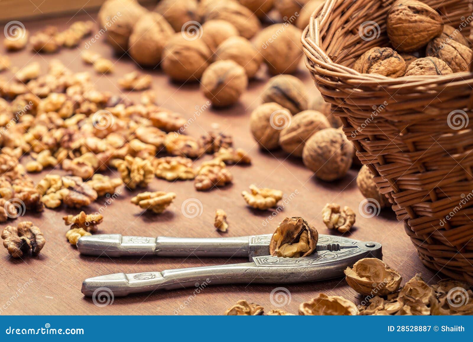 Cracking Walnuts on Wicker Basket Stock Image - Image of brown, wooden ...