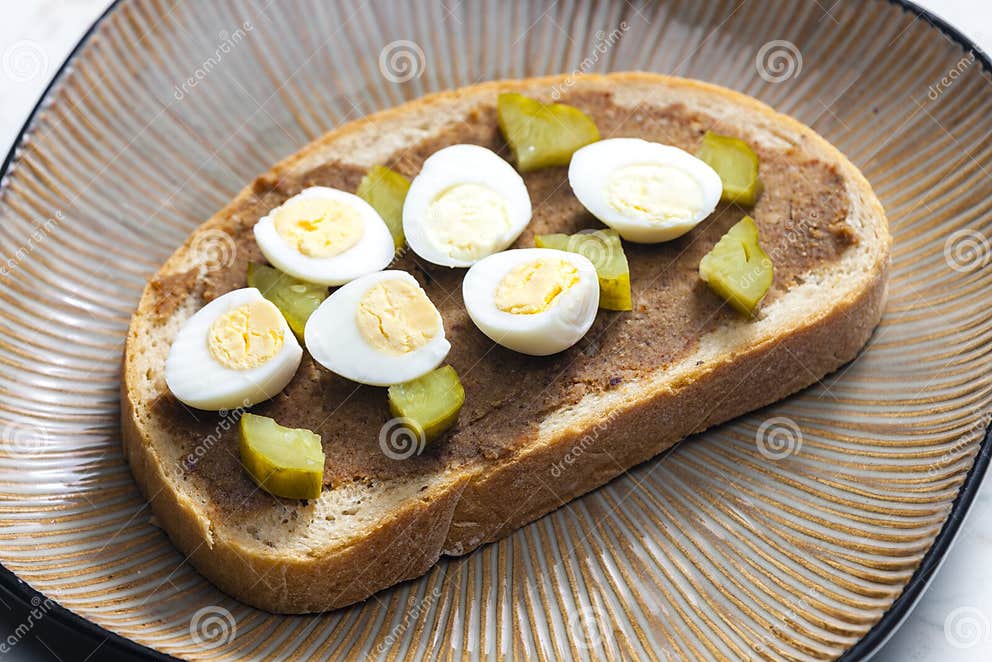 Cracklings Spread with Pickled Cucumber and Boiled Egg on Slice of ...