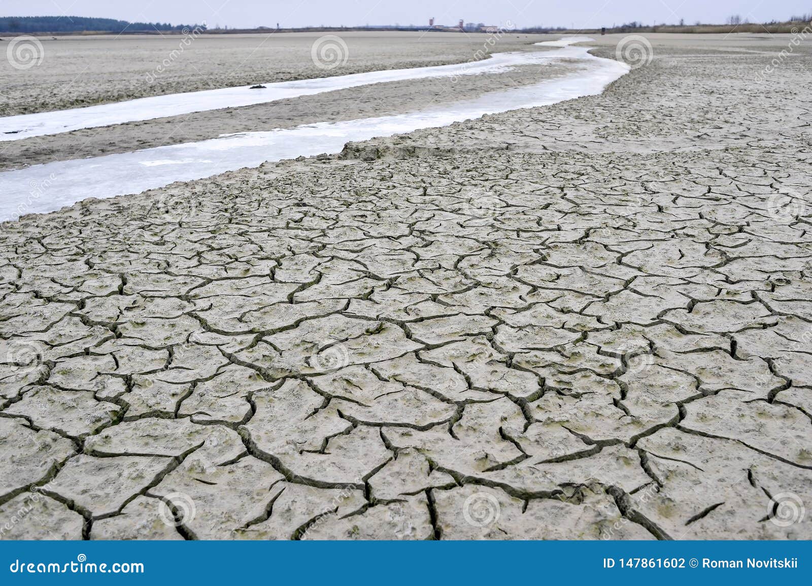 Cracks in the Channel of the Dried-up River Covered with Ice in the ...