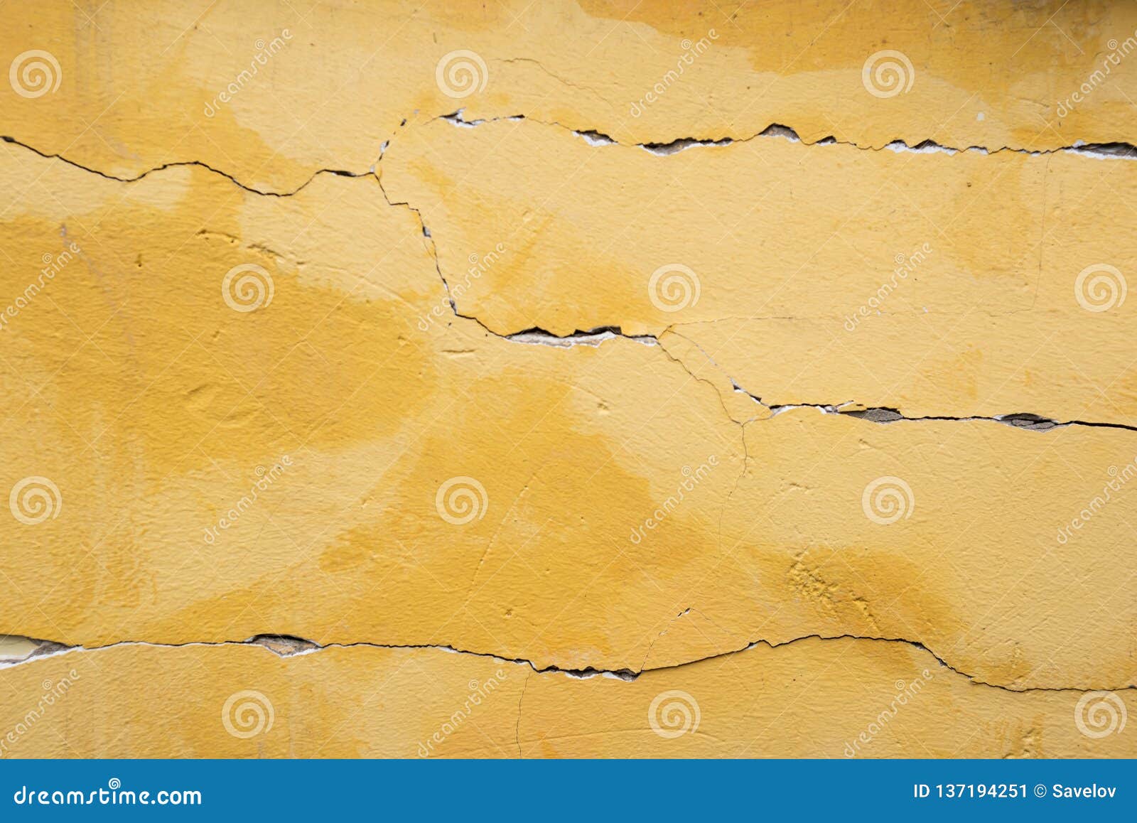 Cracks in the yellow wall stock image. Image of building - 137194251